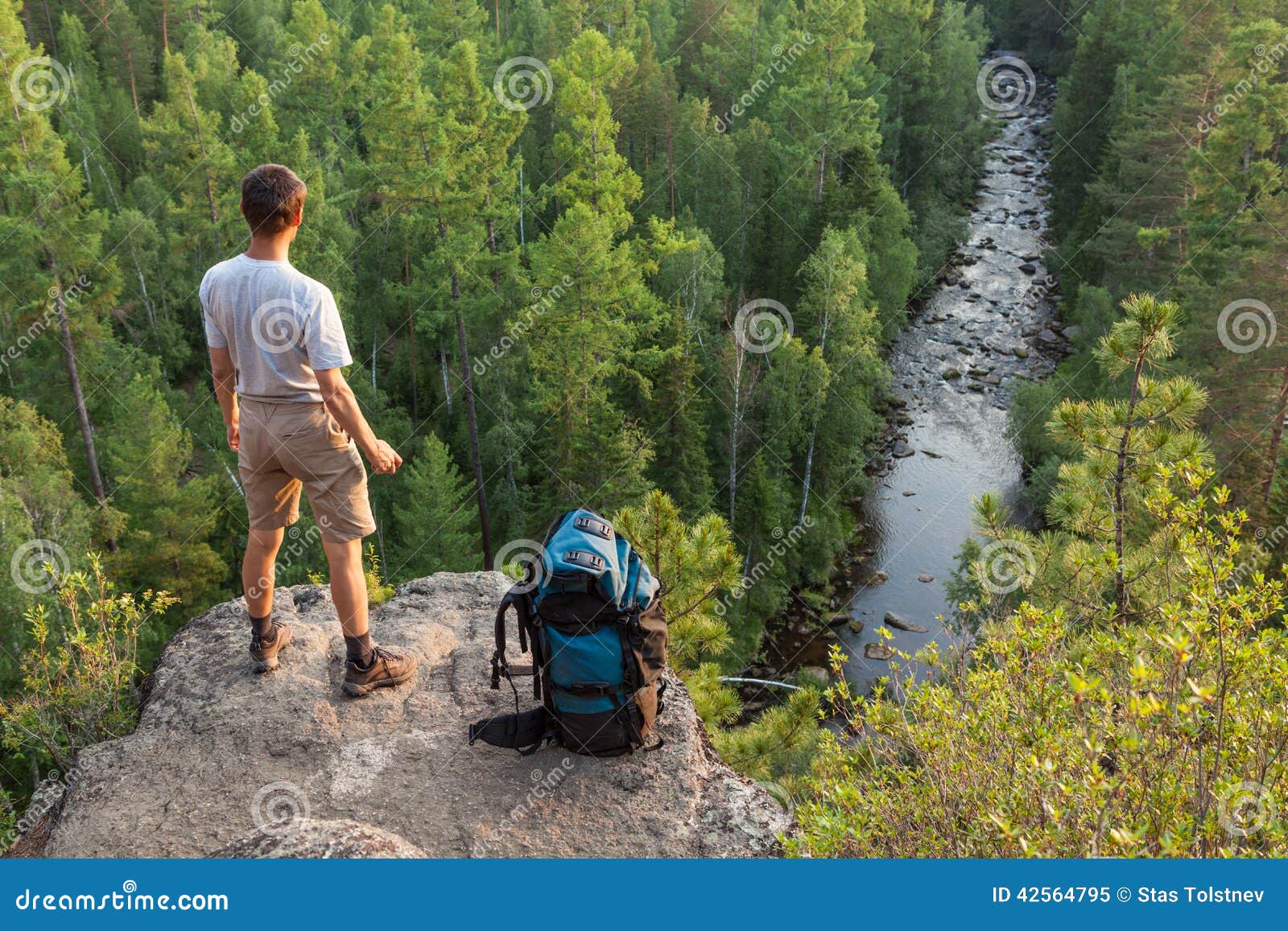 Hiker on big rock stock image. Image of landscape, mountains - 42564795
