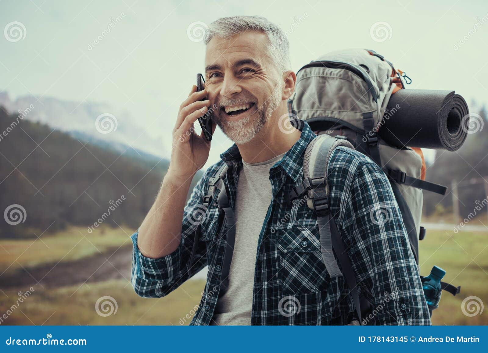 Hiker Calling with a Smartphone Stock Image - Image of smiling ...