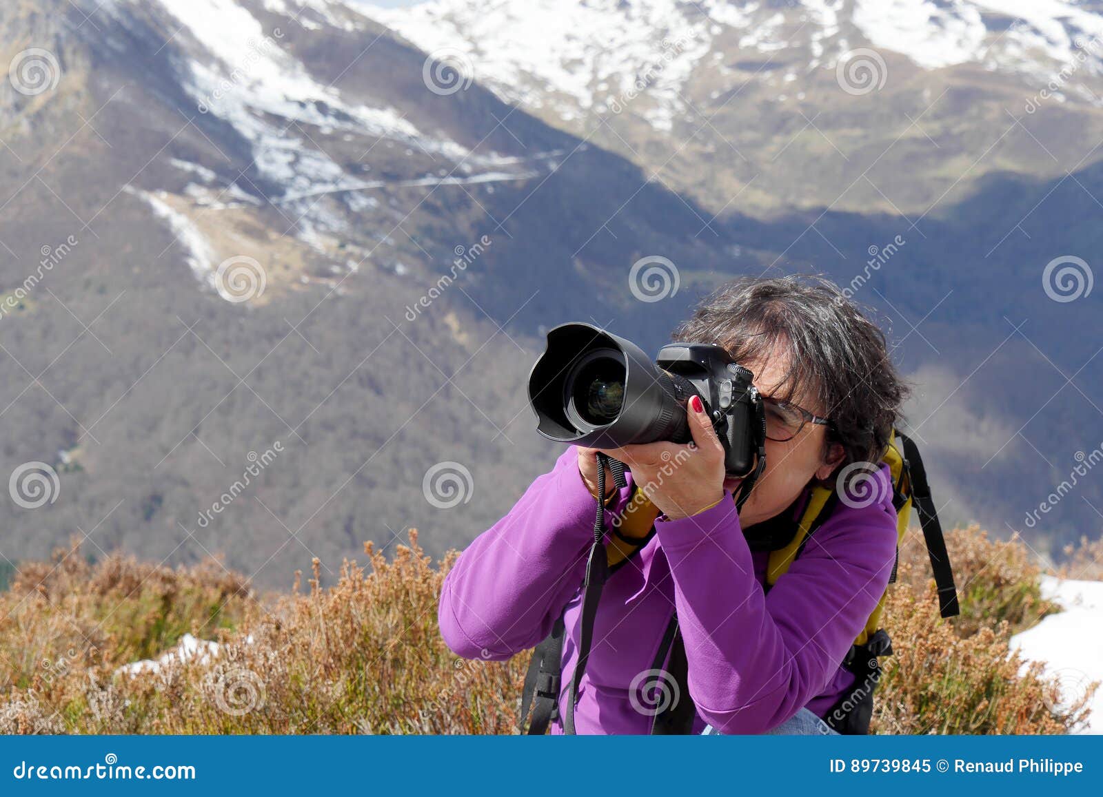 Hiker with Camera and Backpack Taking Picture of Beautiful Mount Stock ...