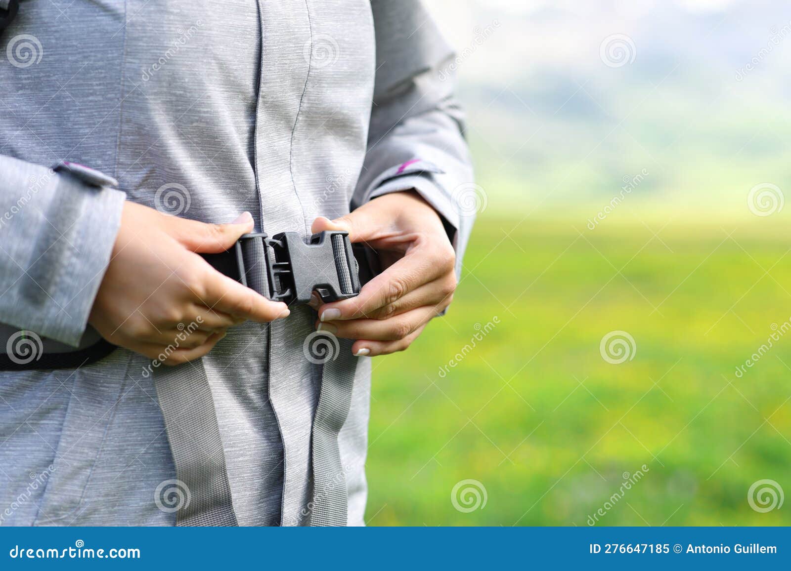 Hiker Fixing Backpack in the Mountain Stock Image - Image of closeup ...