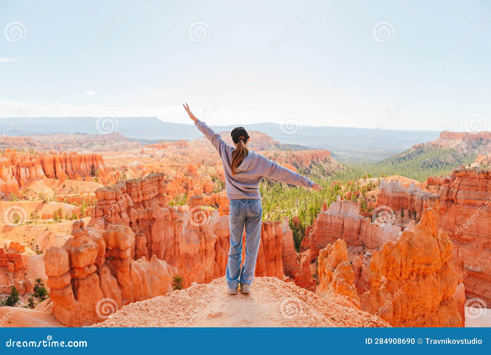 Hiker Girl In Bryce Canyon Hiking Relaxing Looking At Amazing View During Hike On Summer Travel