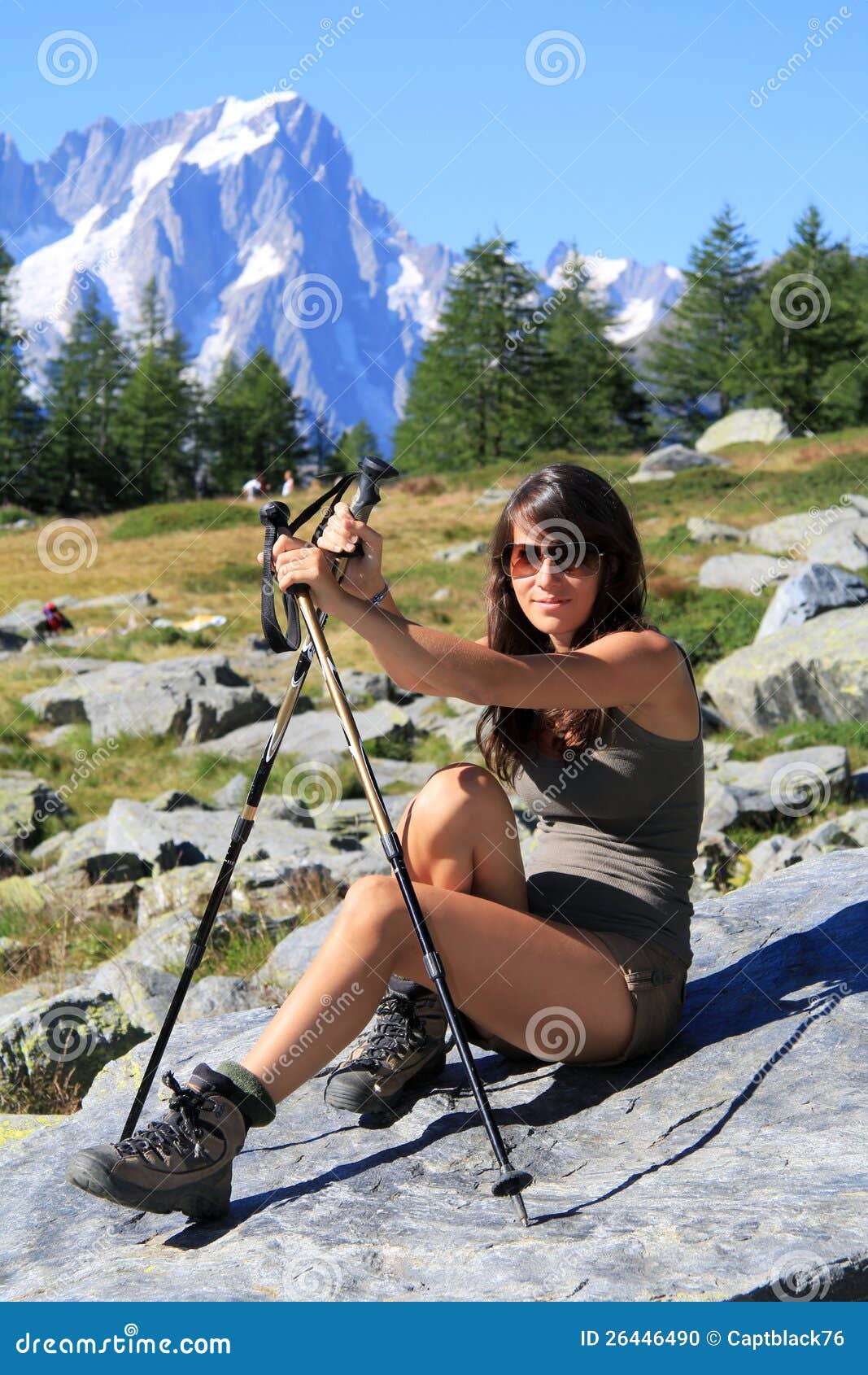 Hiker Girl on a Stone with Mountain Walking Sticks Stock Photo - Image ...