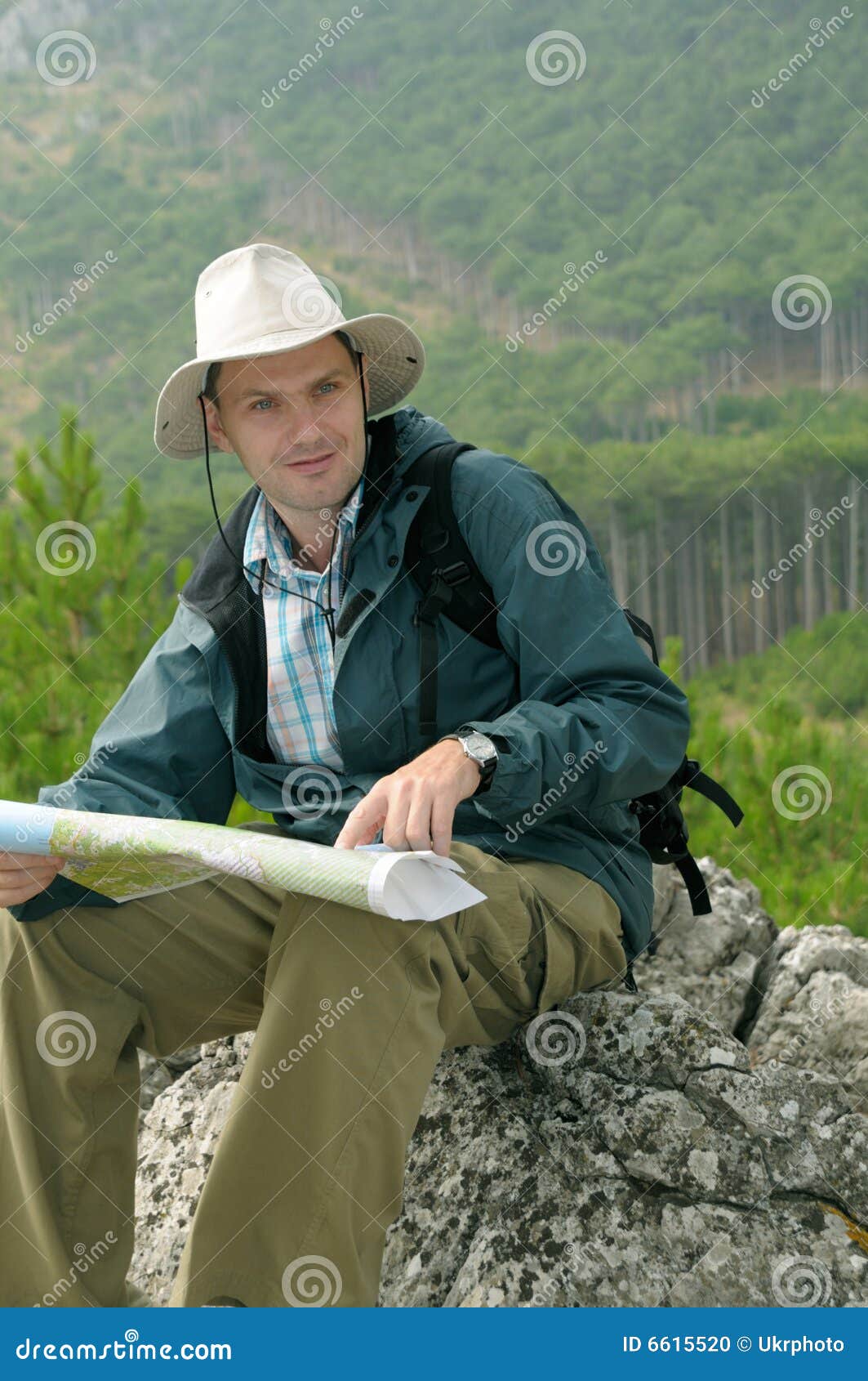 Hiker Looking at a Map while Out Trekking Stock Photo - Image of ...