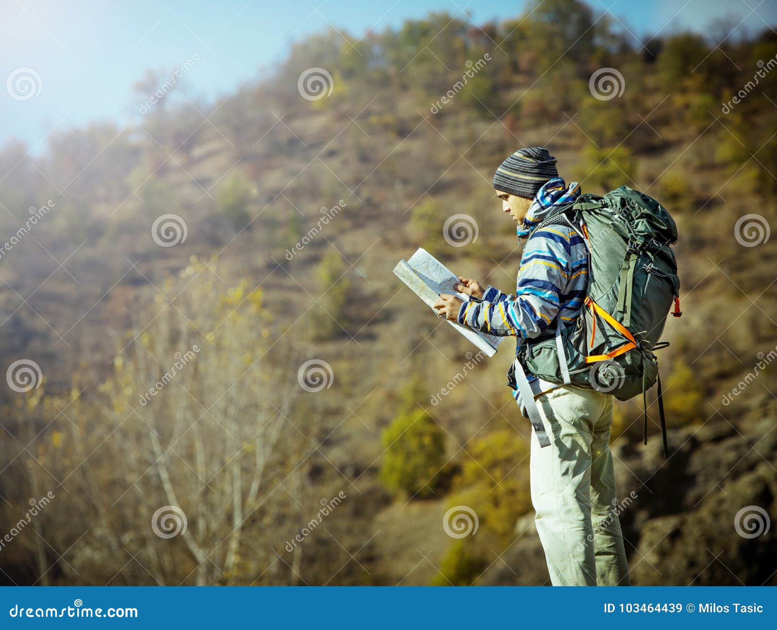 Hiker with Map Exploring Wilderness on Trekking Adventure Stock Image ...