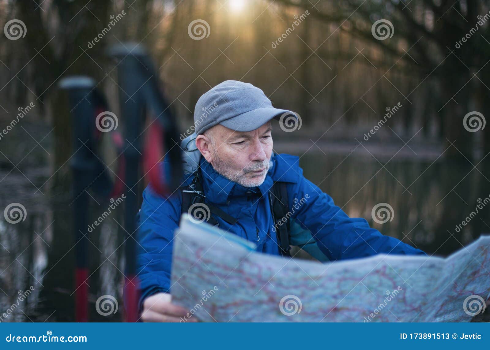 Hiker with map in forest stock image. Image of break - 173891513