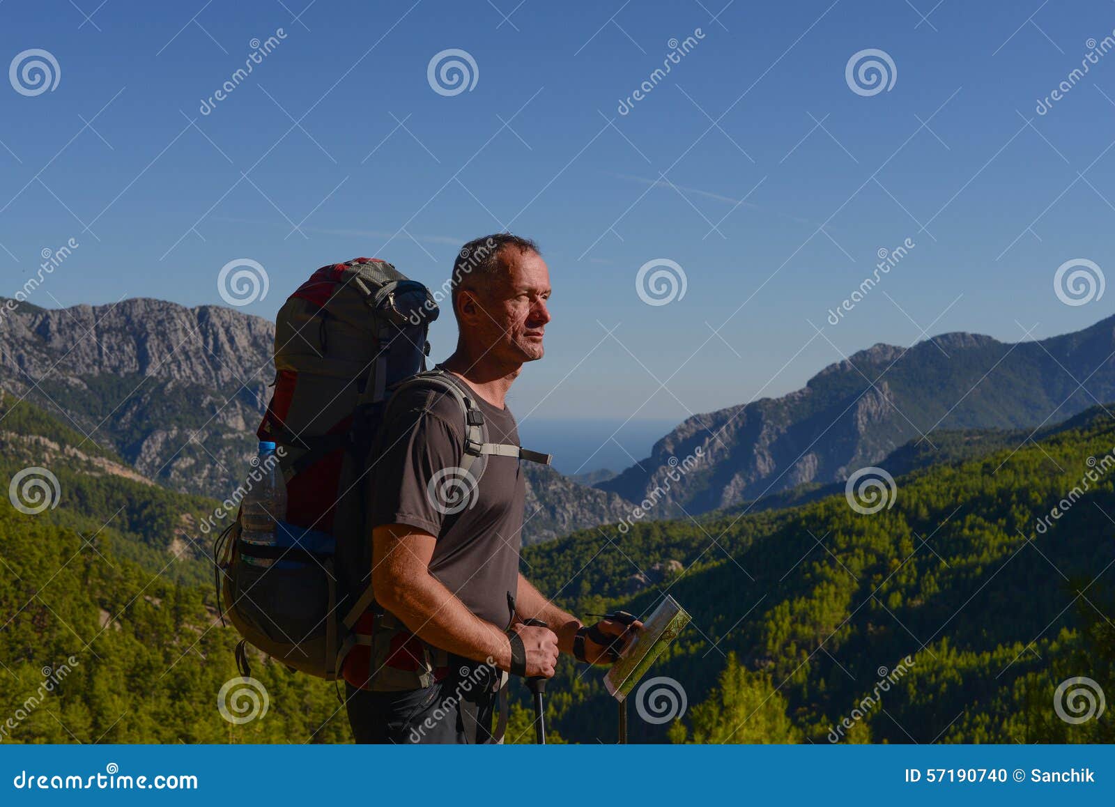 Hiker with map stock photo. Image of mountain, freedom - 57190740