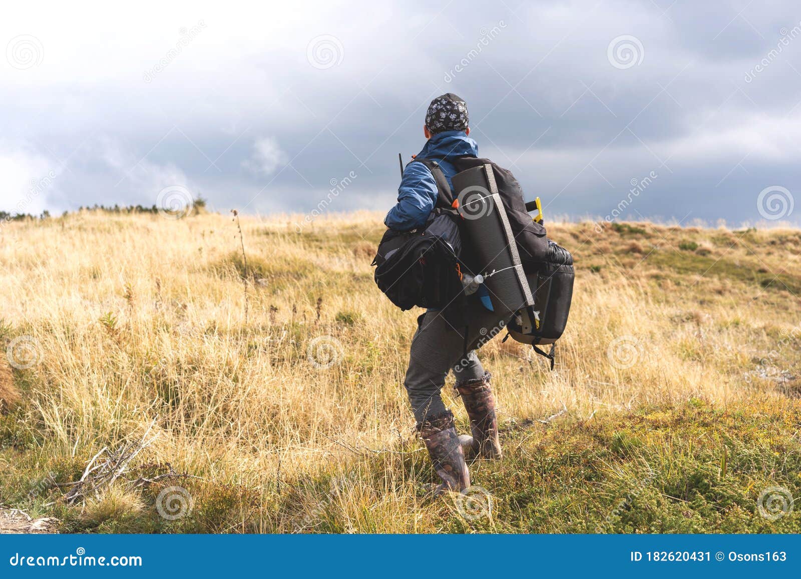 Hiker in the Mountains with Backpacks Stock Image - Image of rock ...