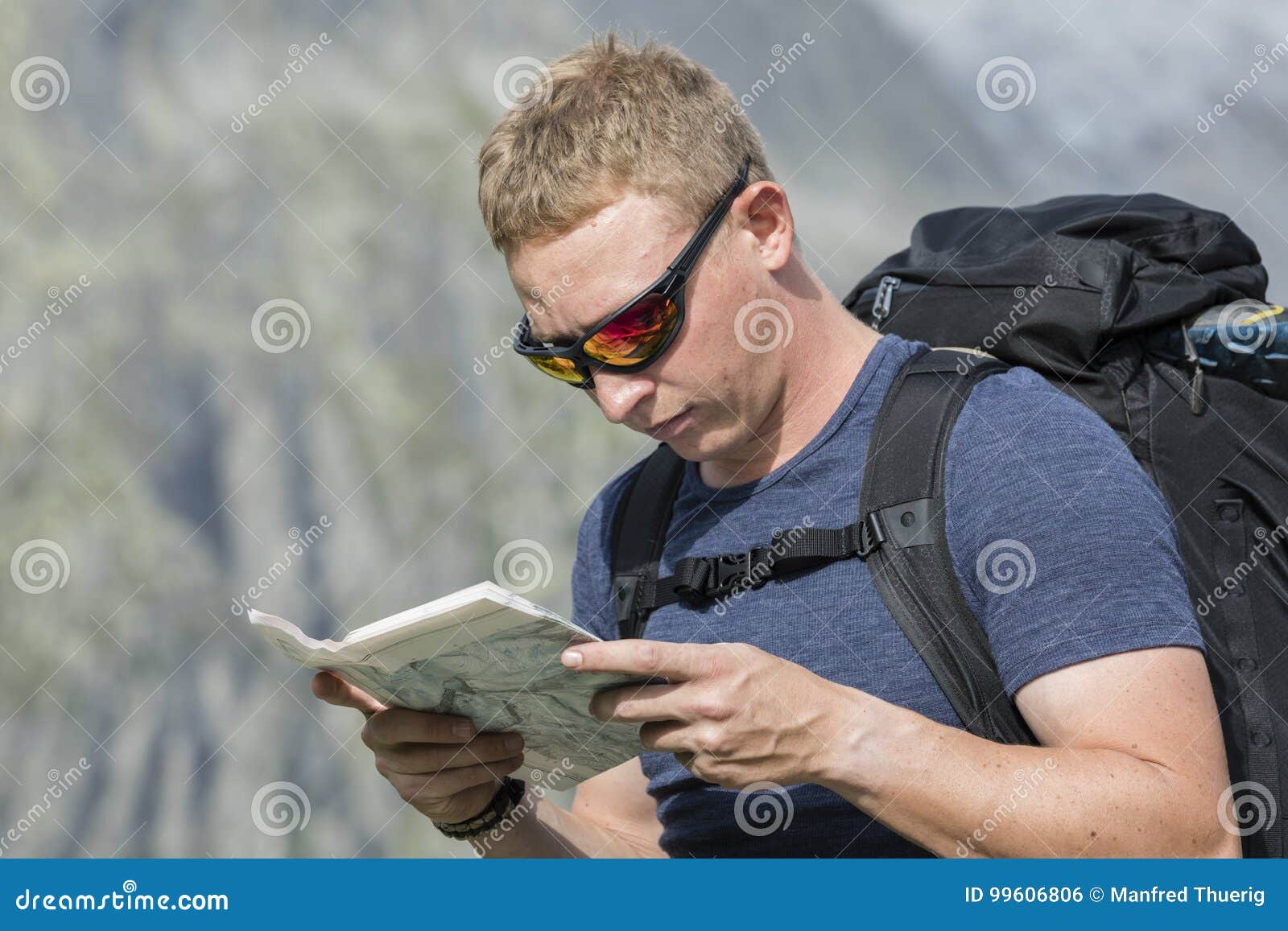 Hiker Oriented with a Map in the Terrain Stock Photo - Image of ...