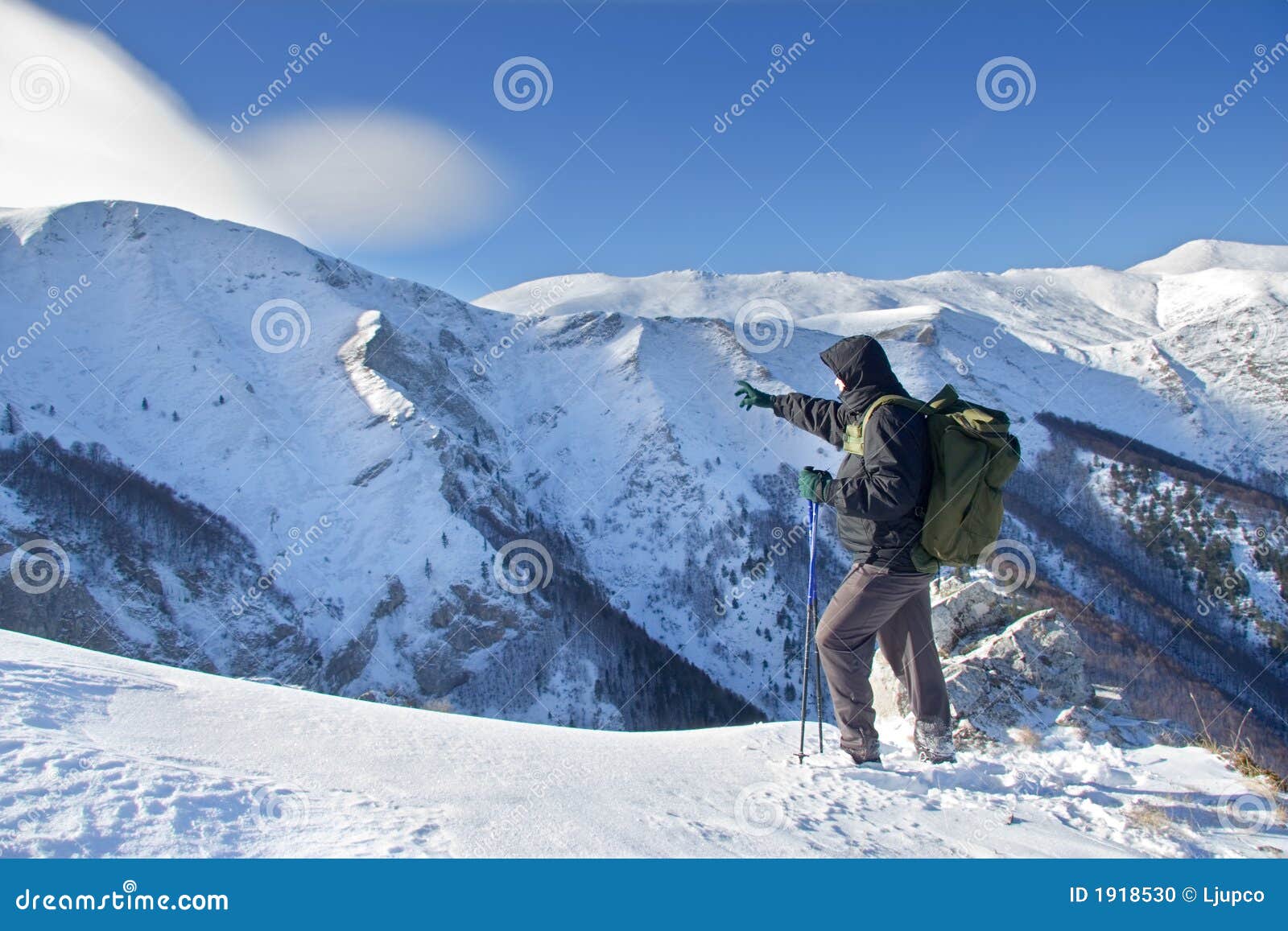 Hiker pointing to the top stock photo. Image of alpine - 1918530