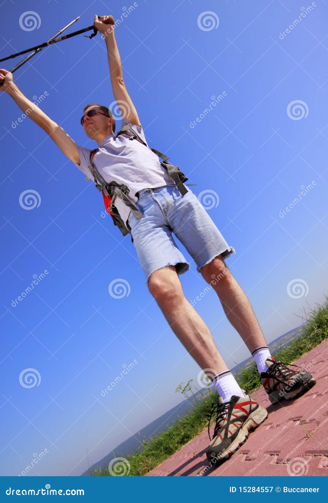 Hiker with Raised Arms and Trekking Sticks Stock Image - Image of boots ...