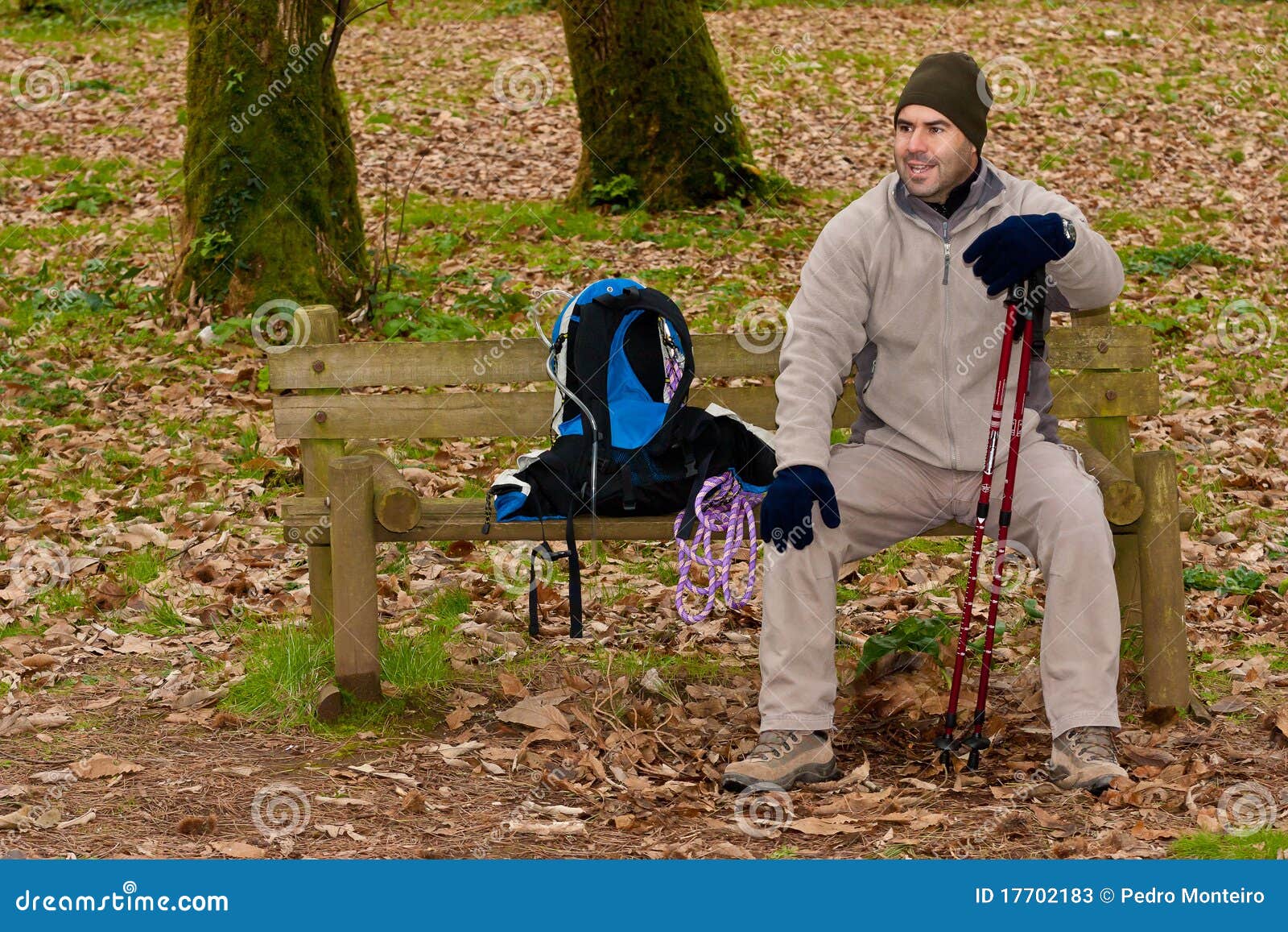 Hiker resting on bench stock image. Image of trekking - 17702183