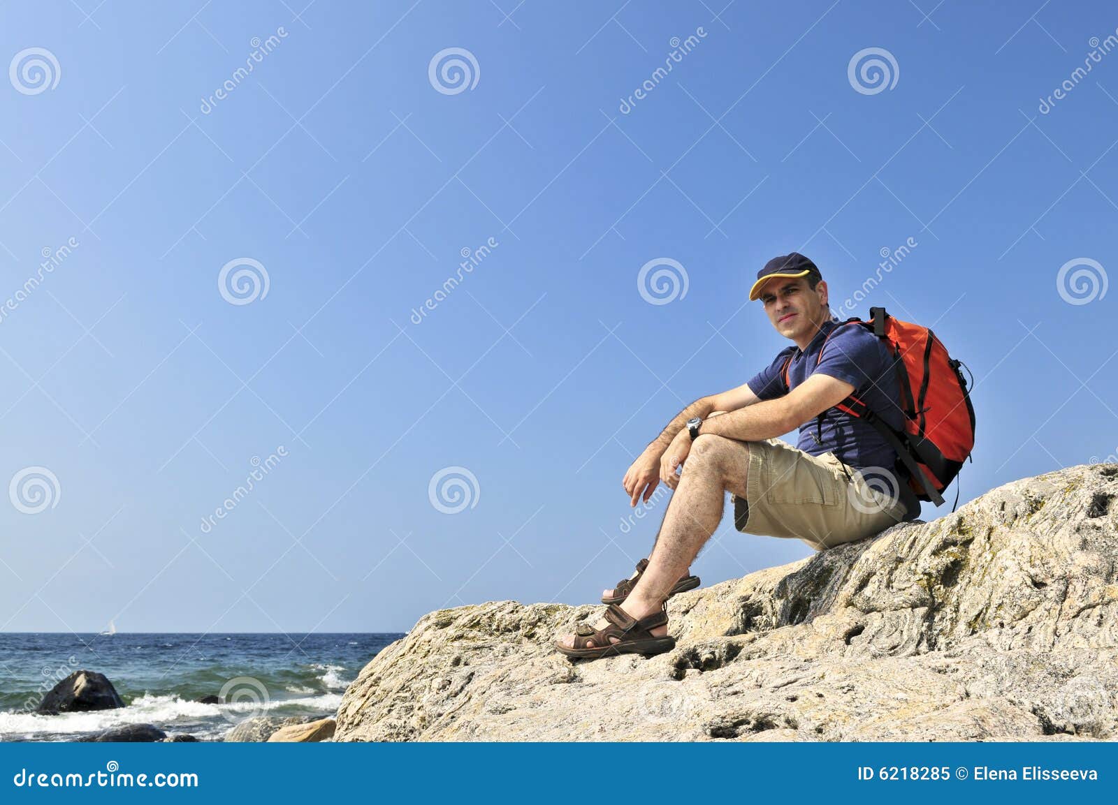 Hiker sitting on a rock stock image. Image of middle, happy - 6218285