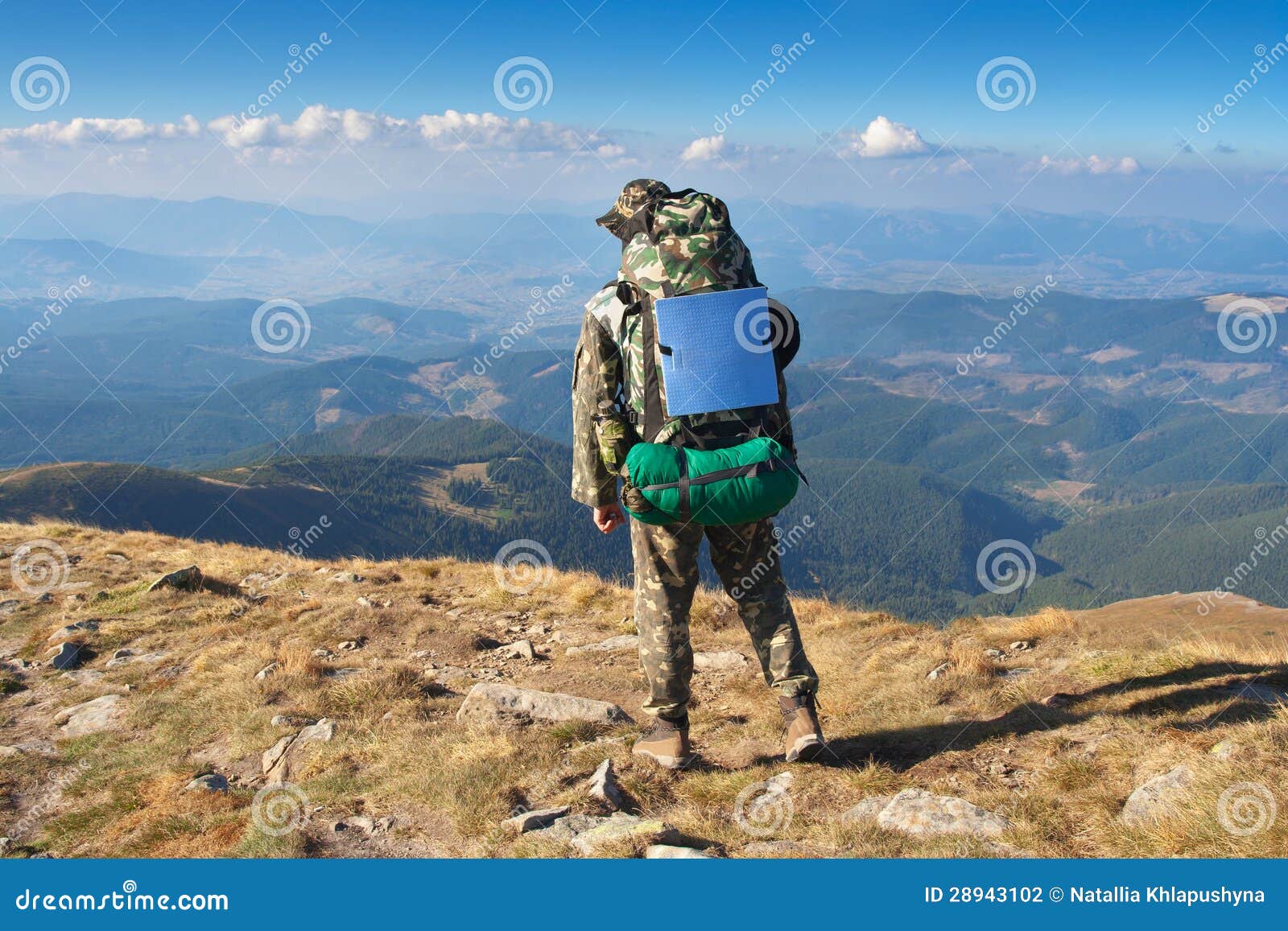 Hiker Stands on a Peak of Mountains and Looking the Scenery Stock Photo ...