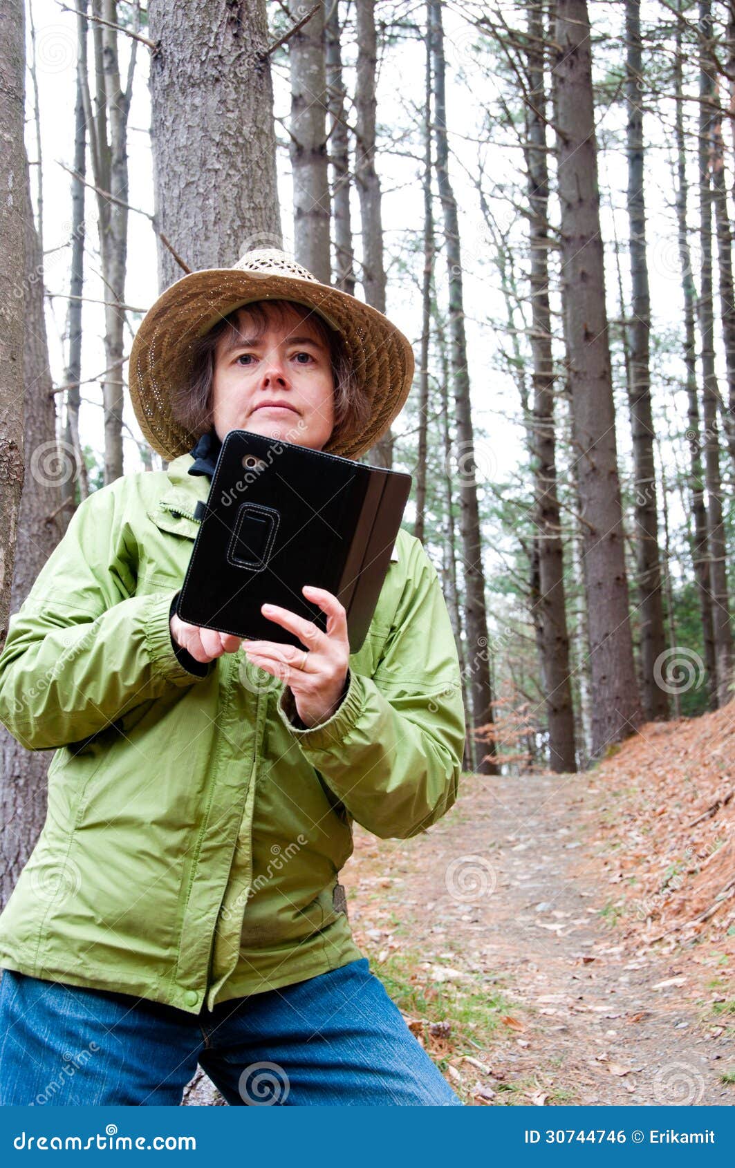 Hiker Using Tablet Computer in the Woods Stock Photo - Image of green ...
