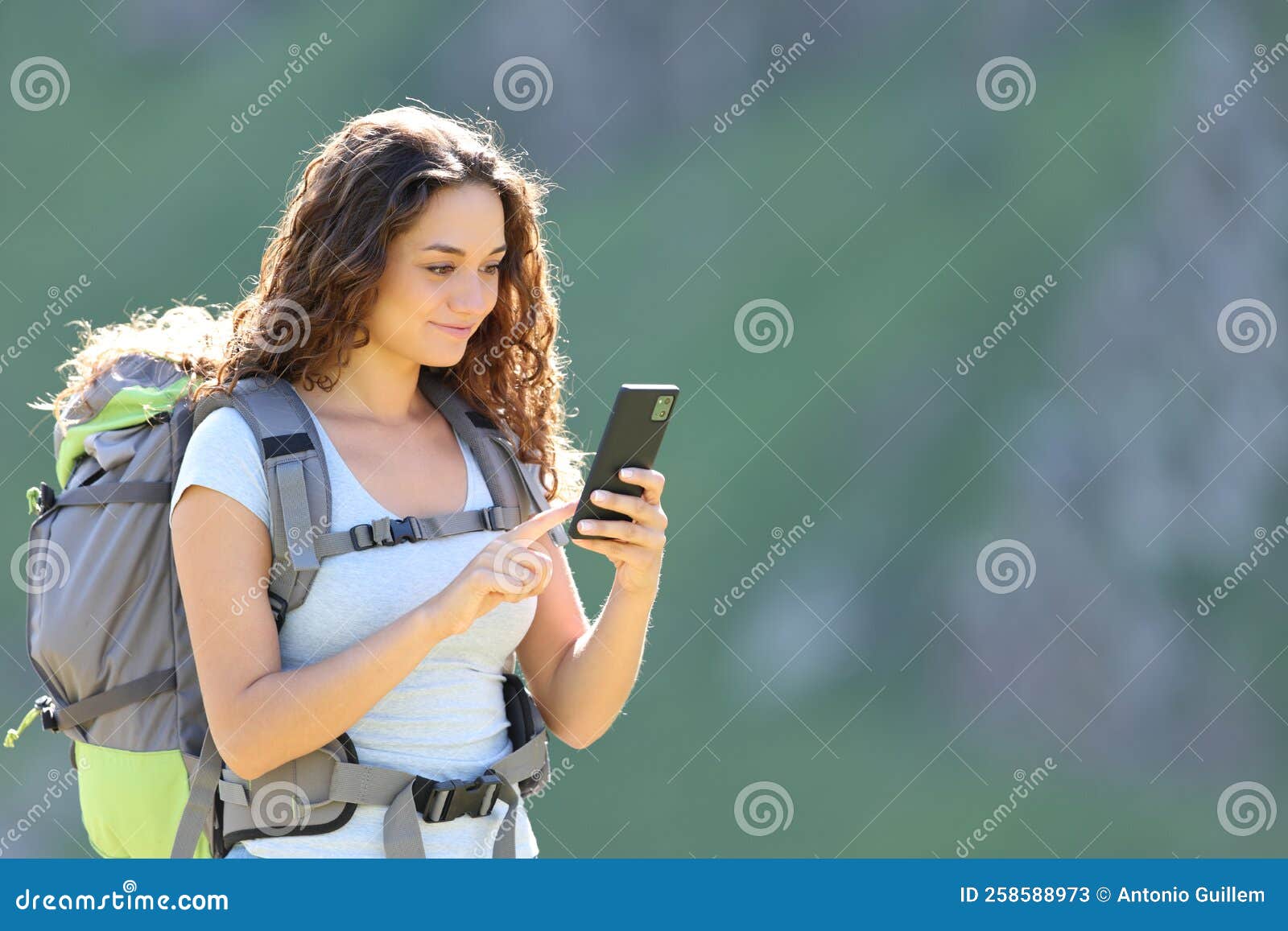 Hiker Walking Using Phone in the Mountain Stock Image - Image of girl ...