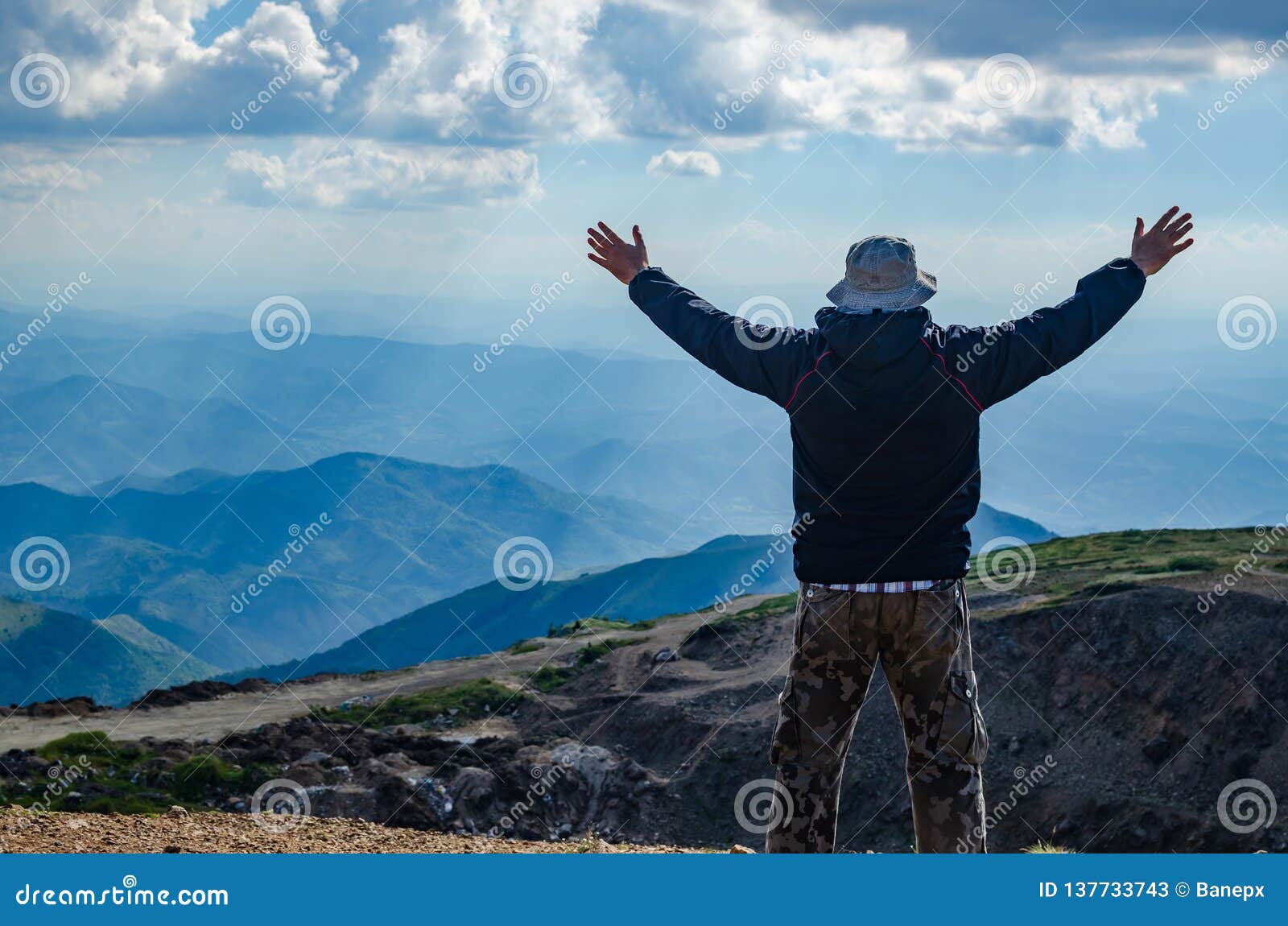Hiker watching a landscape stock image. Image of idyllic - 137733743