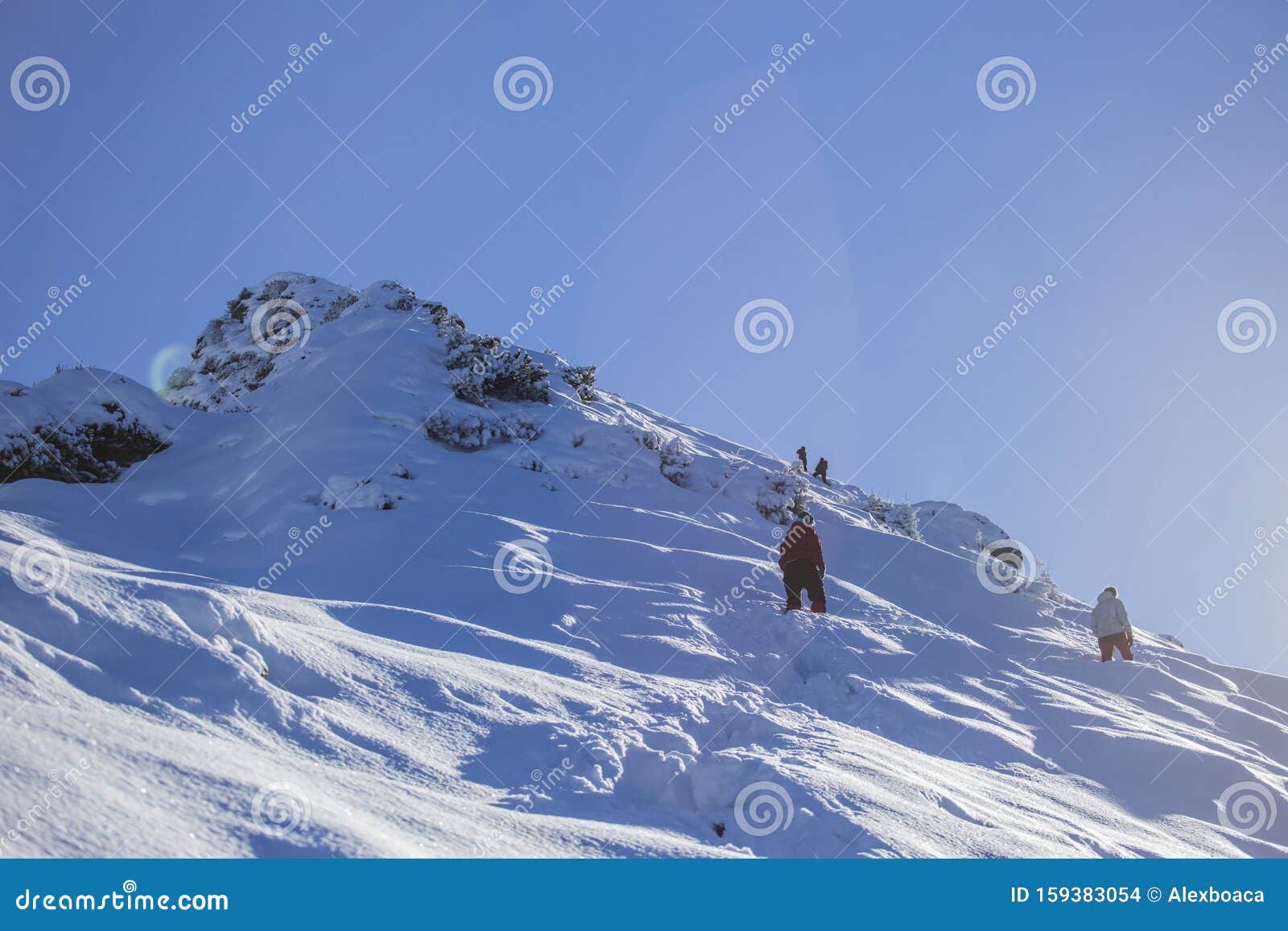 Hikers climb in heavy snow editorial stock image. Image of exploration ...