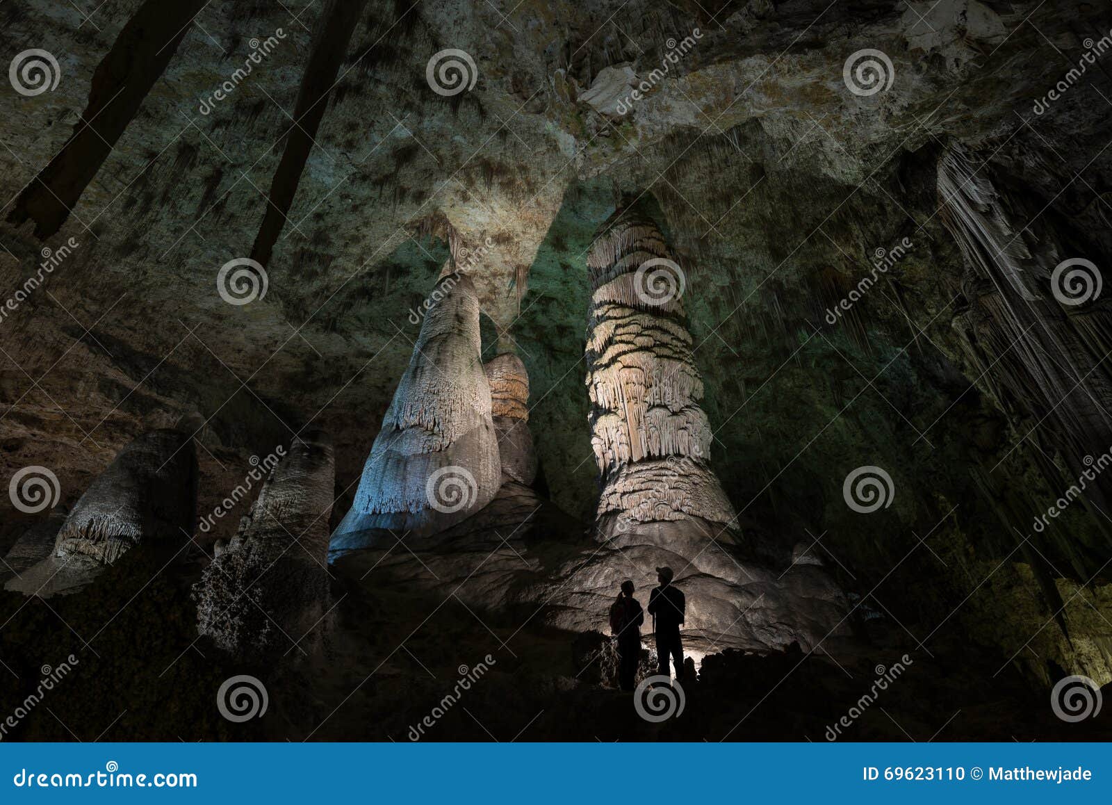 Hikers Exploring a Dramatic Cave Stock Photo - Image of friends ...