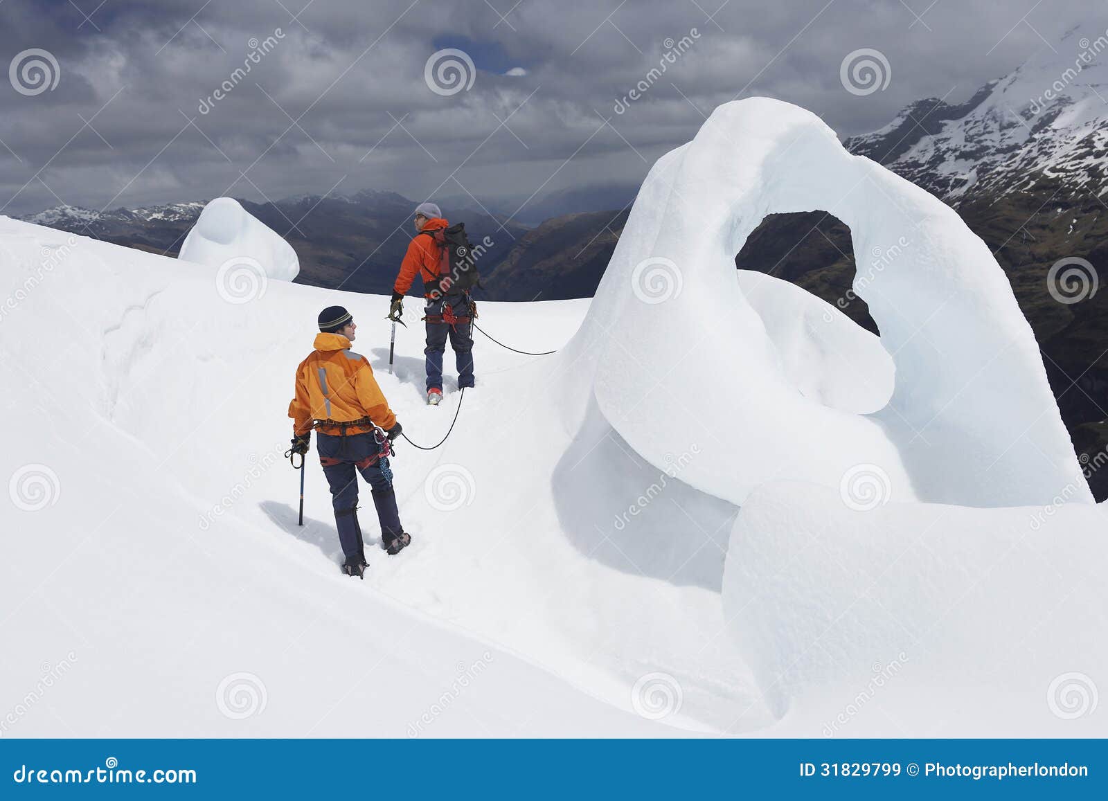 Hikers by Ice Formation in Mountains Stock Image - Image of adventure ...