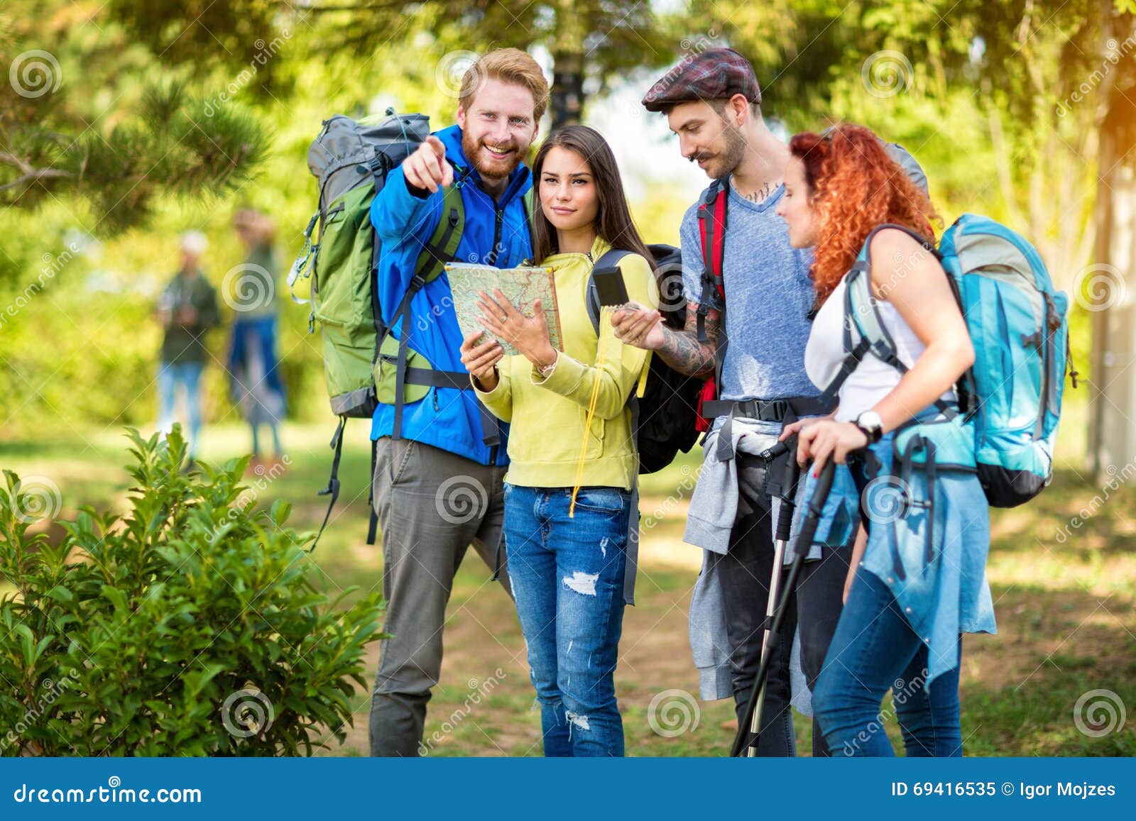 Hikers Look at Map and Compass Stock Image - Image of person, goal ...