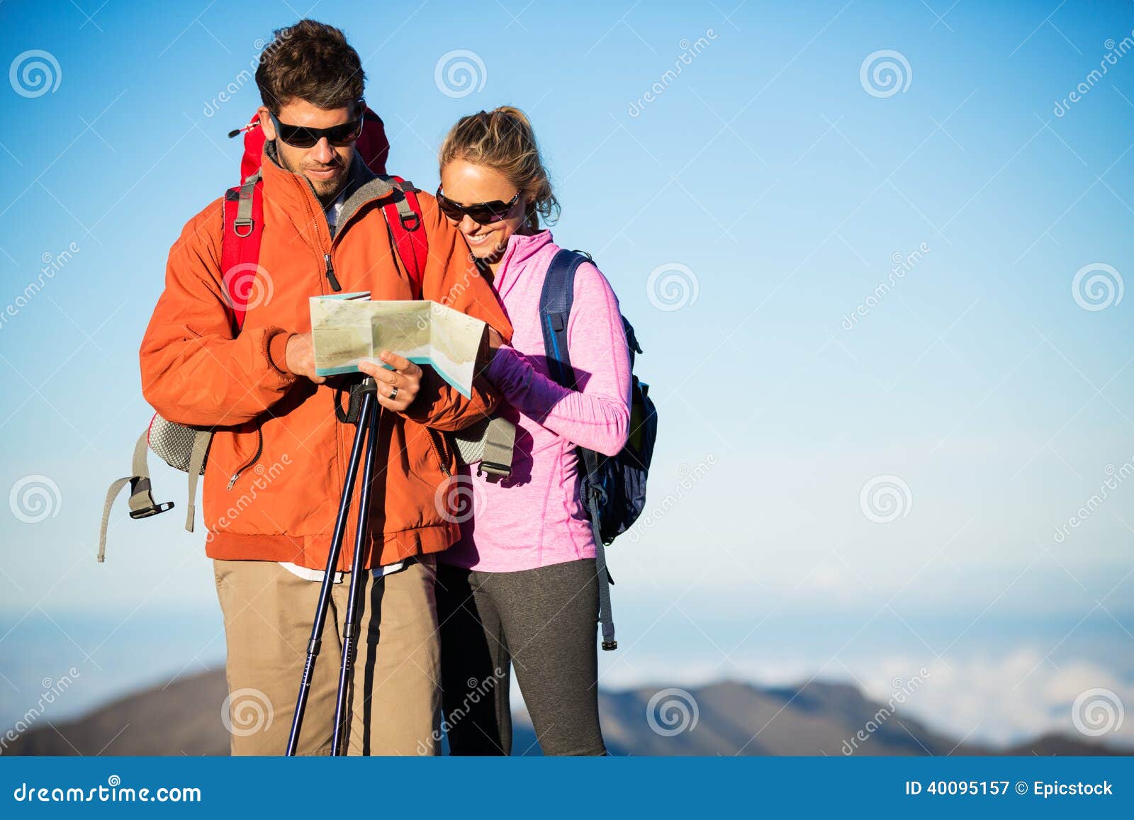 Hikers Looking at Trail Map Stock Image - Image of healthy, sticks ...