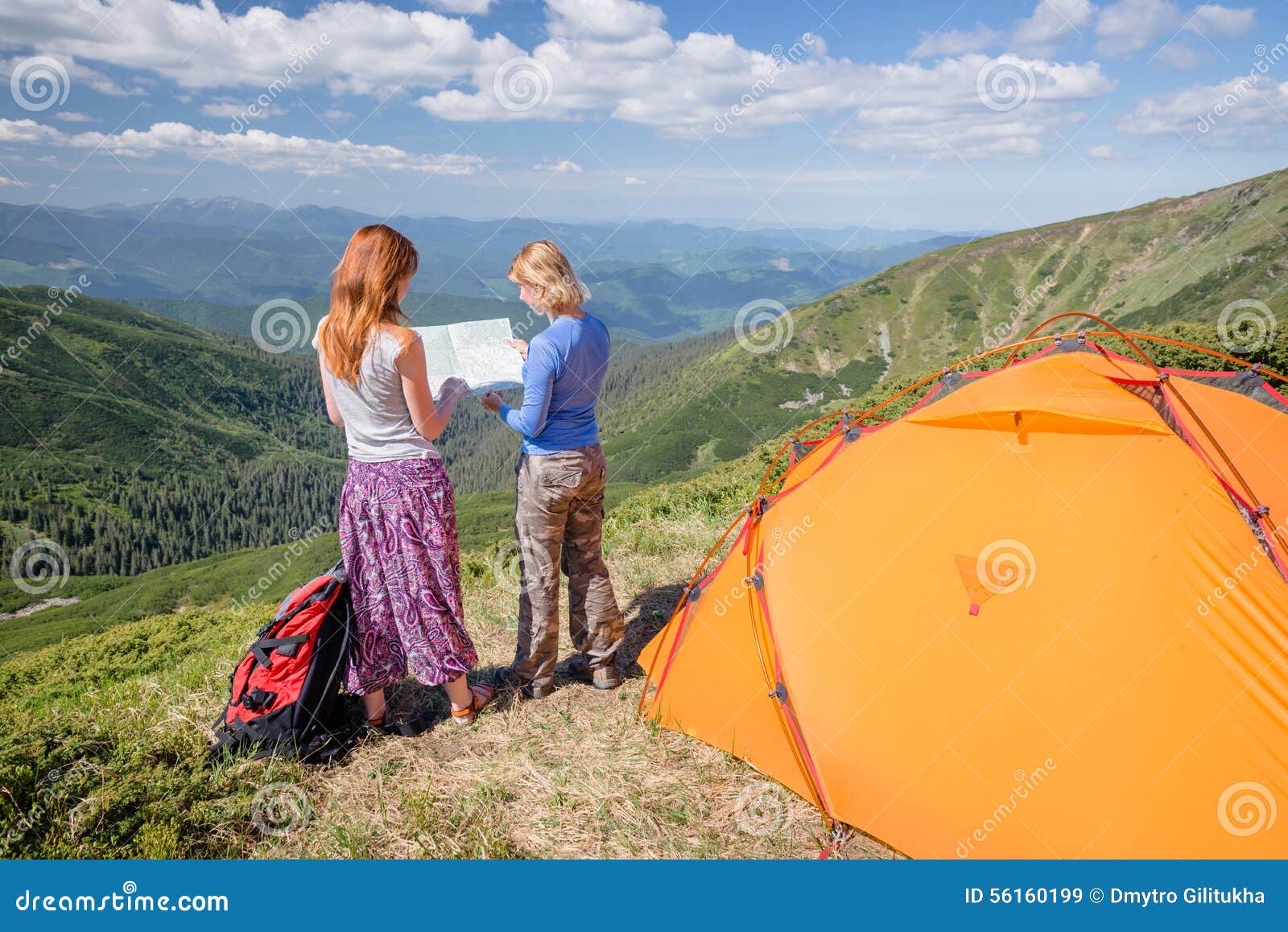 Hikers with Map Exploring in the Mountain Stock Image - Image of ...