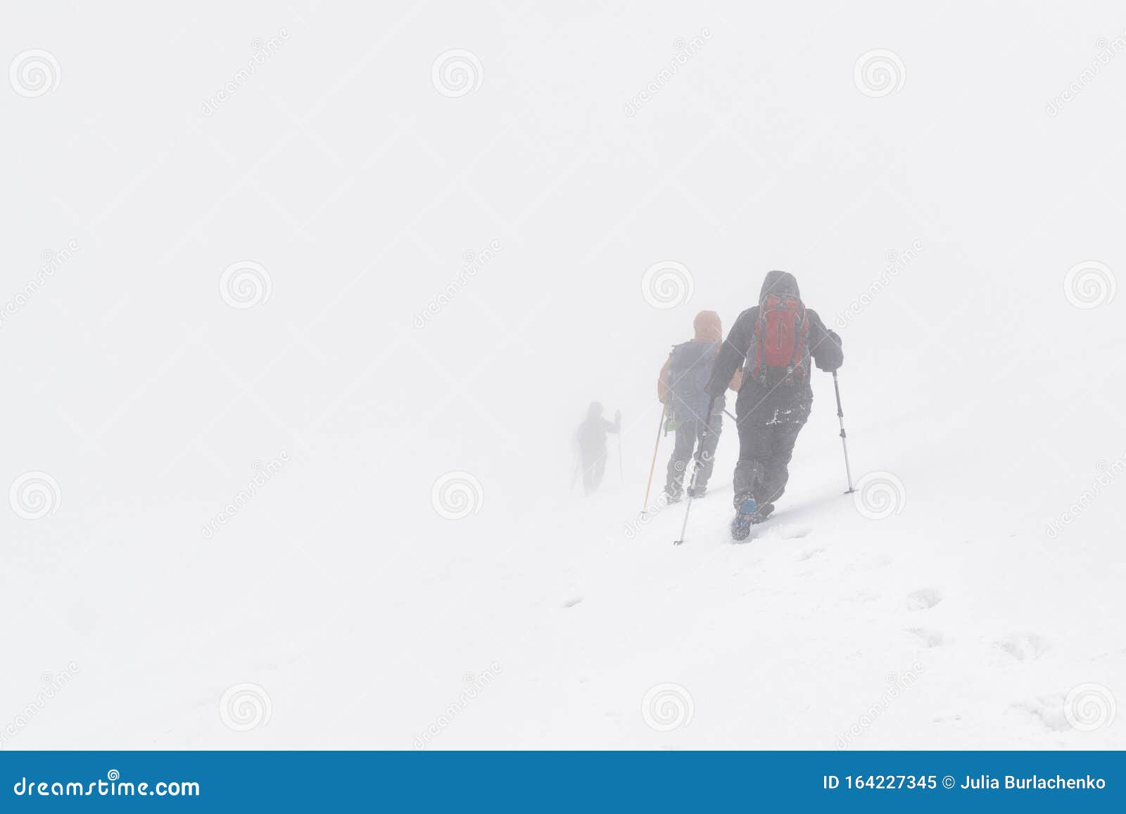 Hikers in the Mountains in Extreme Bad Weather Stock Image - Image of ...