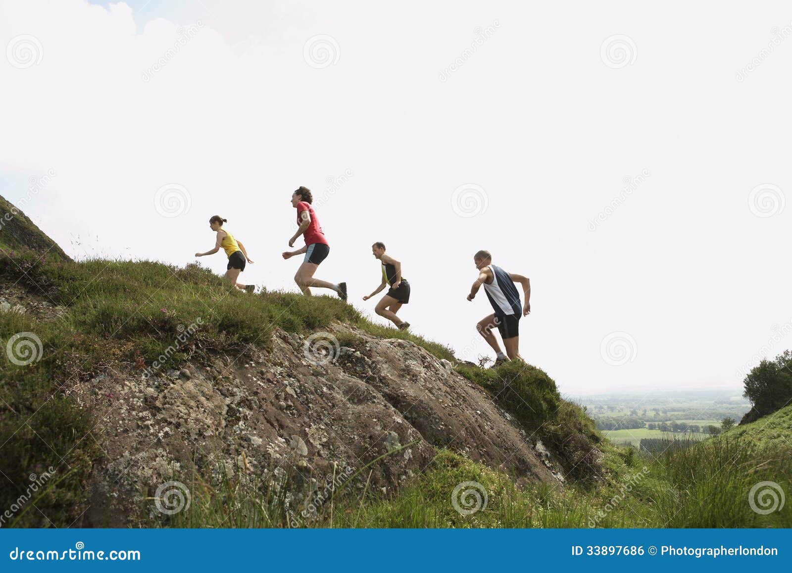 Hikers Running on Hill stock photo. Image of adventure - 33897686