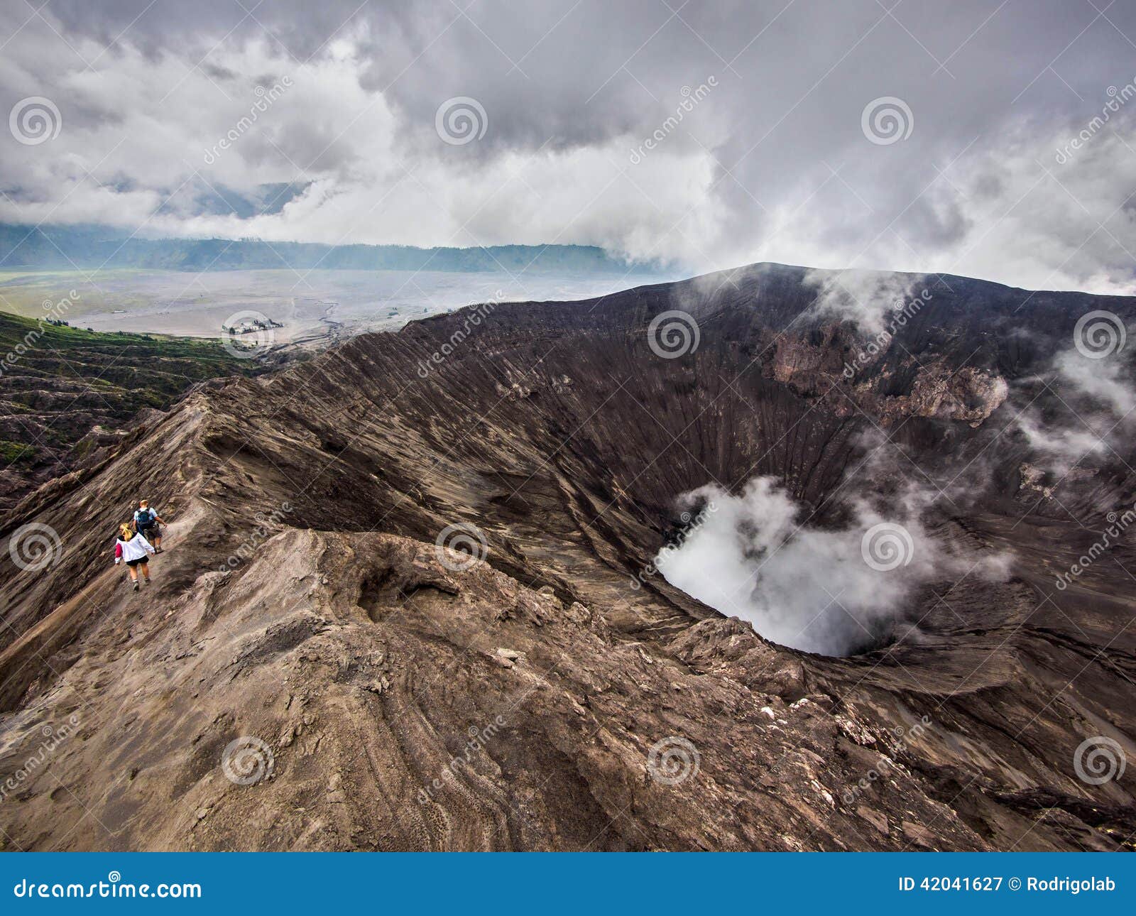 Hikers Walking Around the Rim of Gunung Bromo Volcano, Java, Indonesia ...