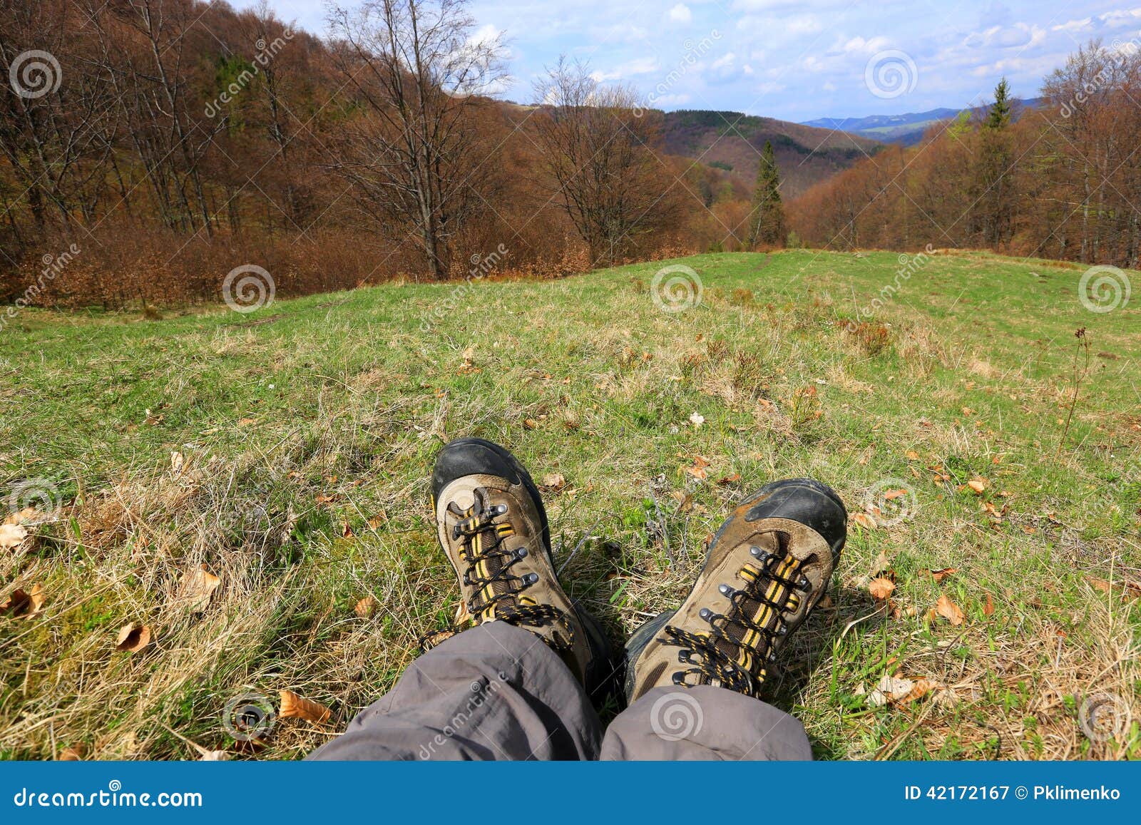 Hiking Feet on meadow stock image. Image of lying, shoes - 42172167