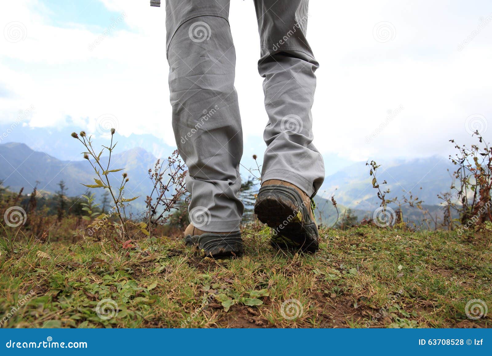 Hiking legs on mountain stock photo. Image of hike, boot - 63708528
