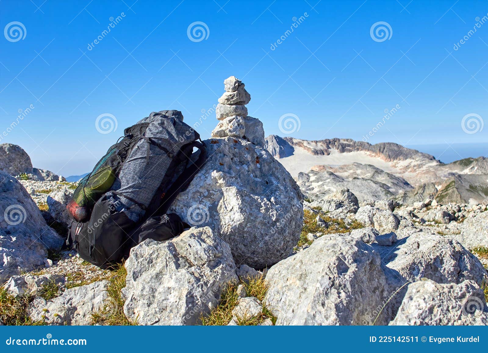 Hiking in the Mountains, Camping, Backpack on the Rocks Stock Image ...