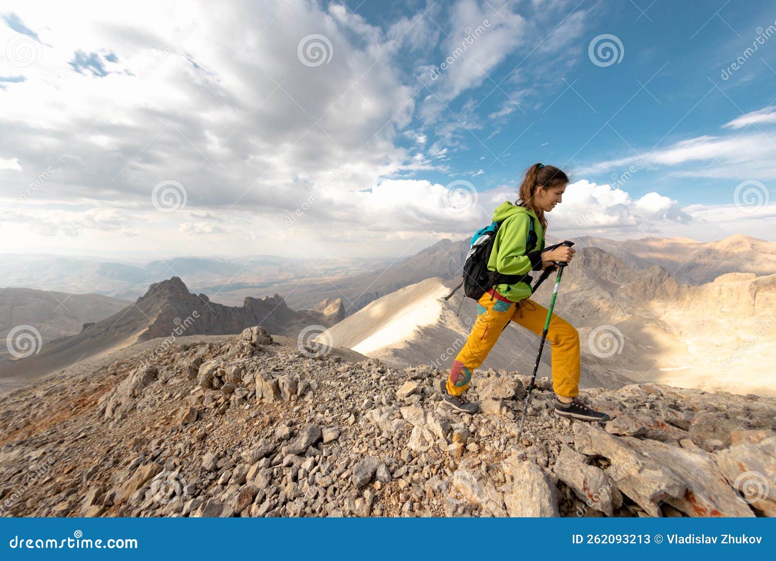 Hiking in the Mountains. Girl with a Backpack in the Mountains Stock ...