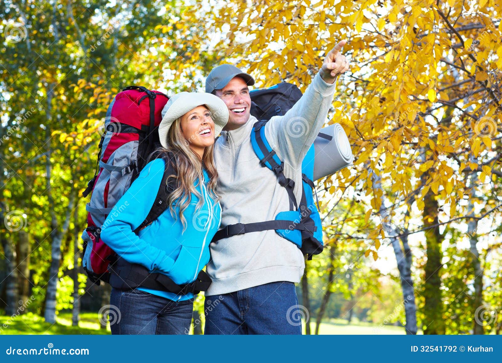 Hiking young couple. stock photo. Image of adventure - 32541792