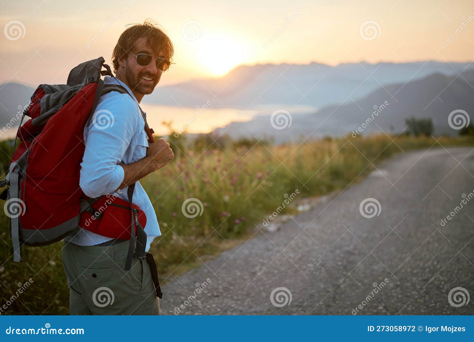 Hiking. Young Man with Backpacks at Evening Stock Photo - Image of ...