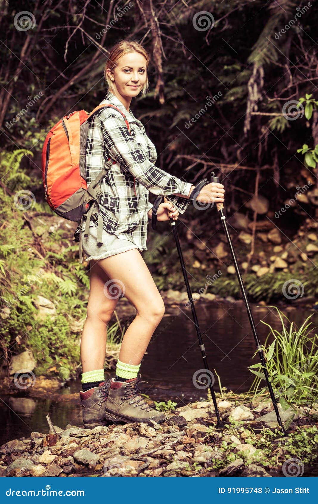 Hiking Young Woman stock photo. Image of shorts, creek - 91995748