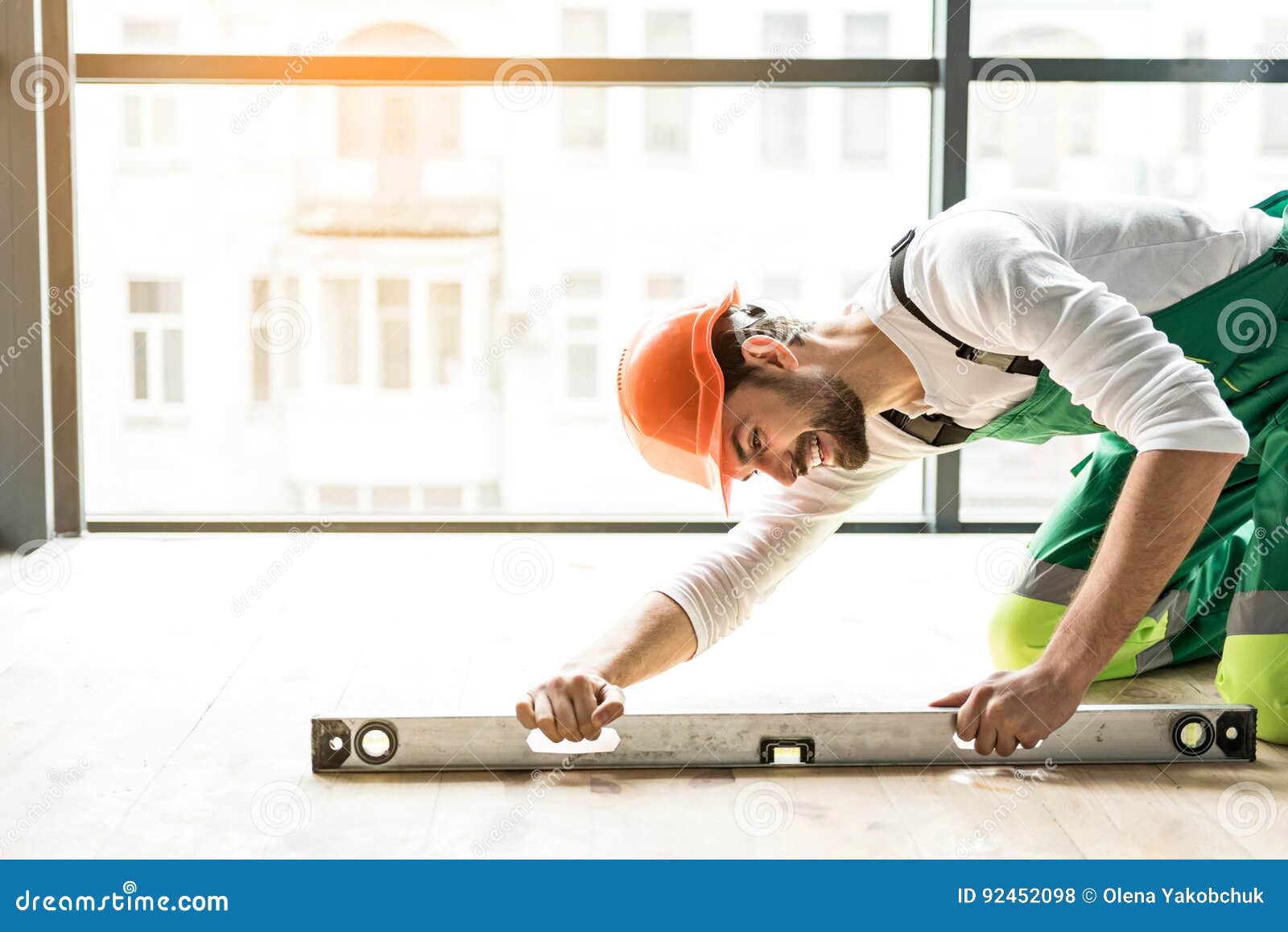Hilarious Smiling Constructor Using Instrument Stock Photo - Image of ...