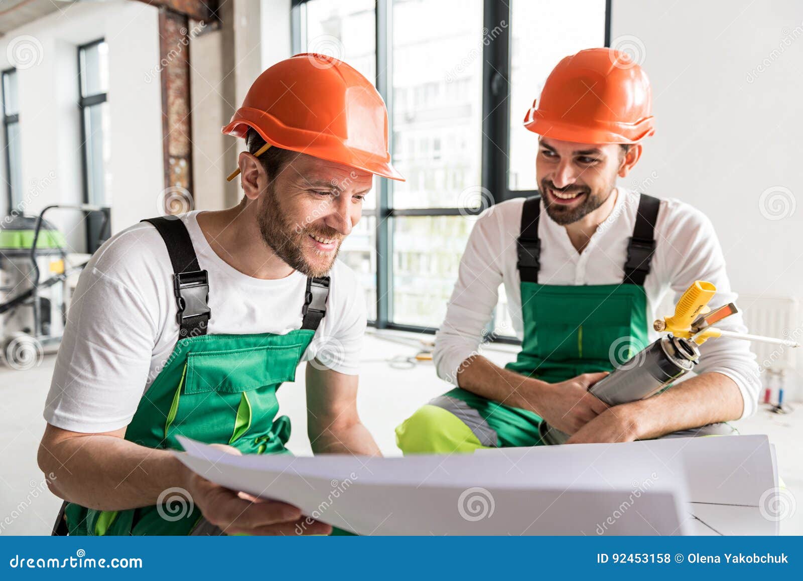 Hilarious Smiling Constructors Keeping Plan Stock Photo - Image of ...