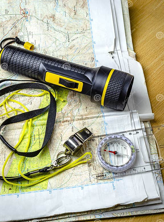 A Hill Walking Map with Compass Torch and Whistle. Stock Image - Image ...