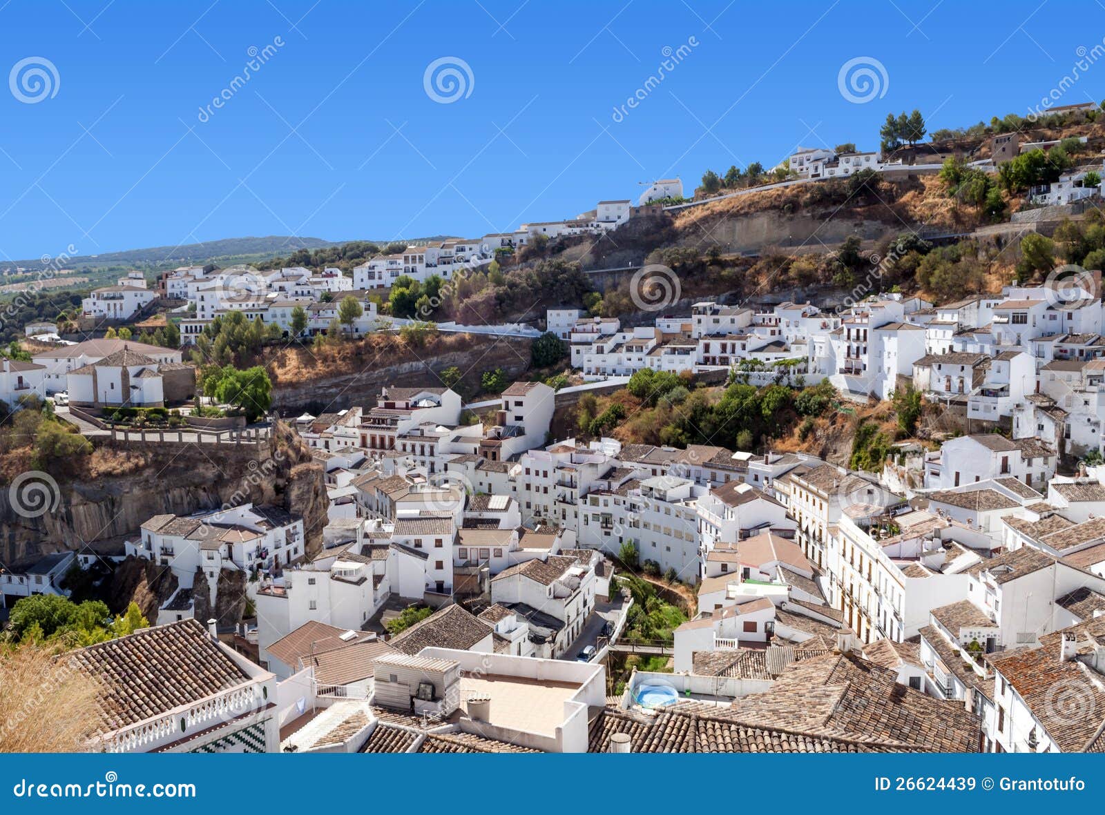 Hillside of Setenil De Las Bodegas Stock Image - Image of light ...