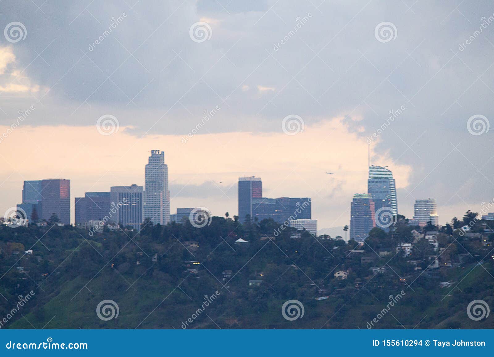 Hillside View of Homes and Streets with Panoramic Sky in Pink and ...