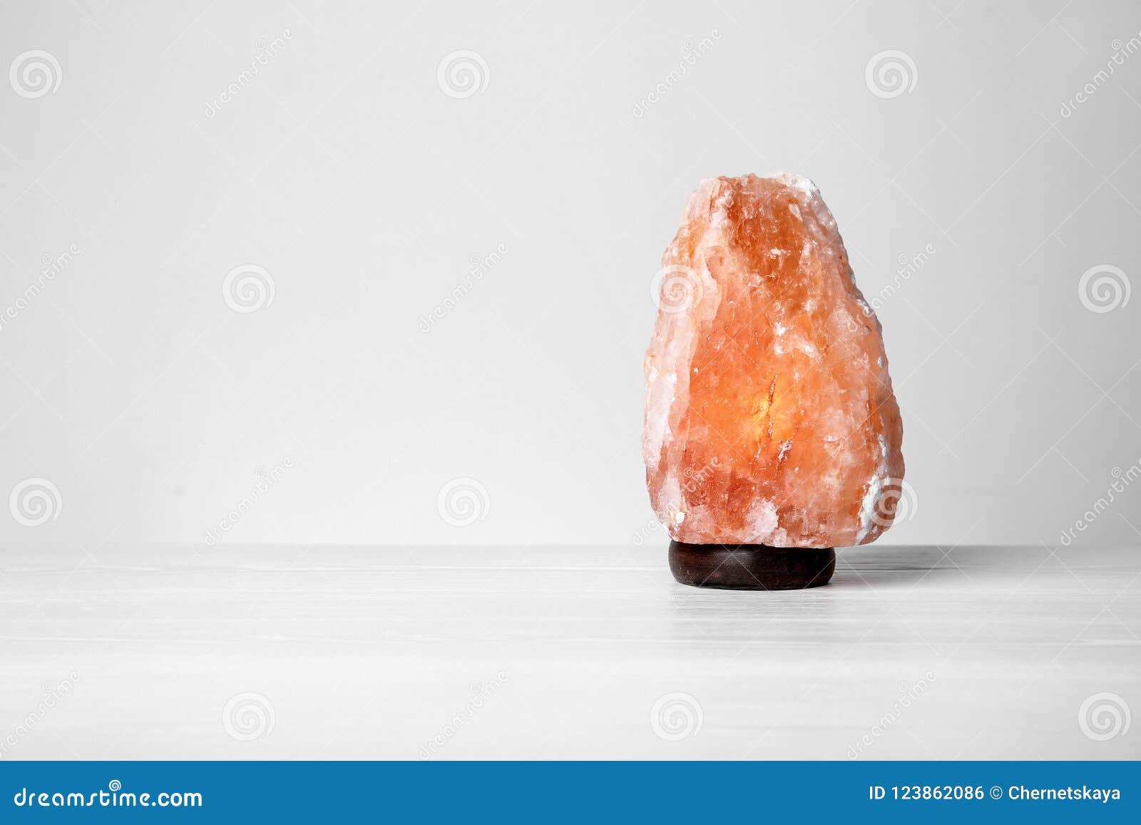Himalayan Salt Lamp on Table Stock Photo - Image of background, natural ... Himalayan Salt Lamp on Table Stock Photo - Image of background, natural ...