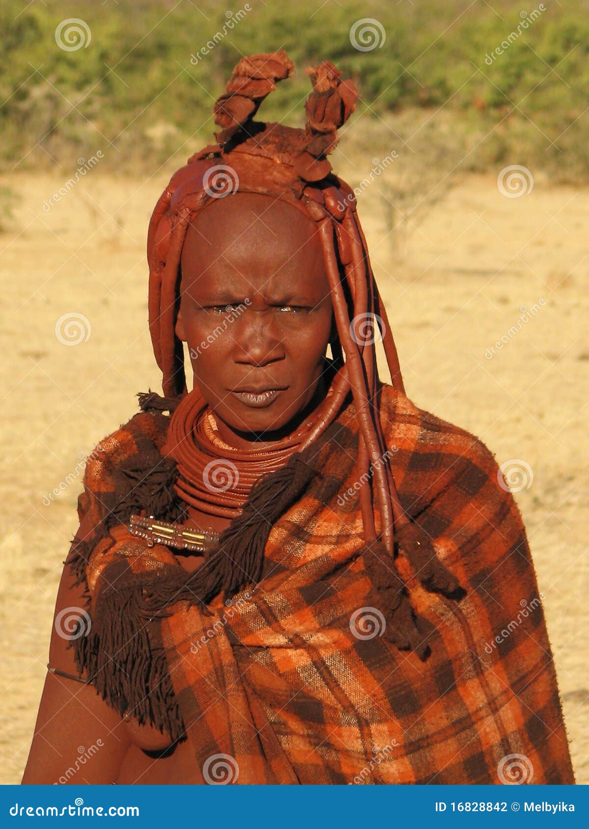 Himba Woman Hiding Under The Tree Stock Image | CartoonDealer.com #39496147