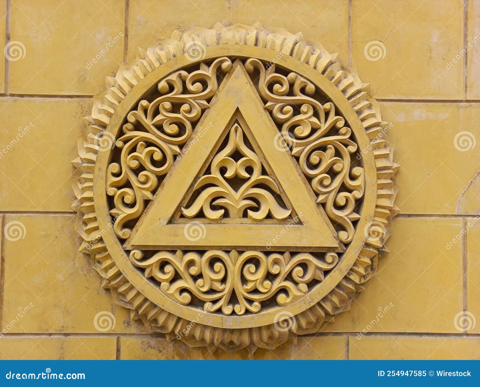 Hindu Design Sculpture of a Triangle Inside a Circle in the Stone Wall ...