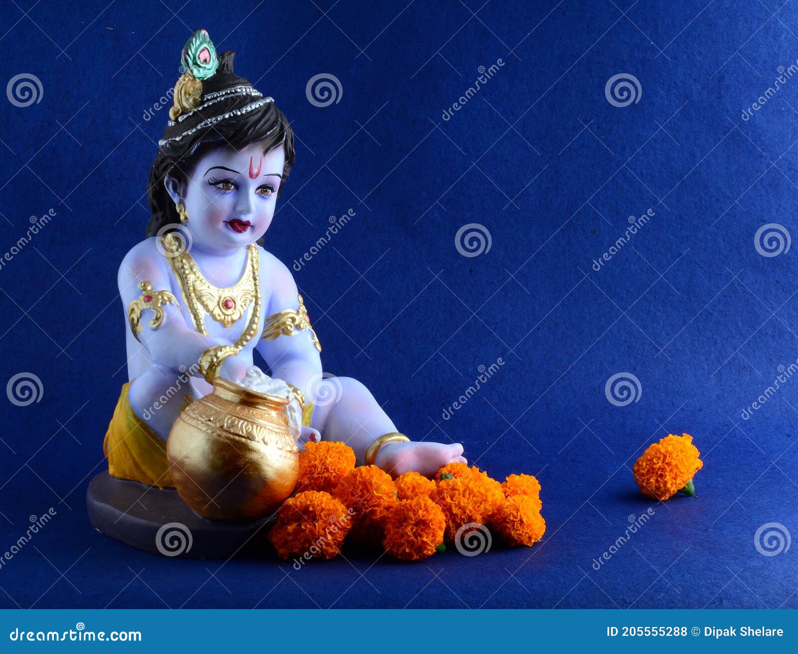 Hindu God Krishna on Blue Background Stock Photo - Image of flute, idol ...