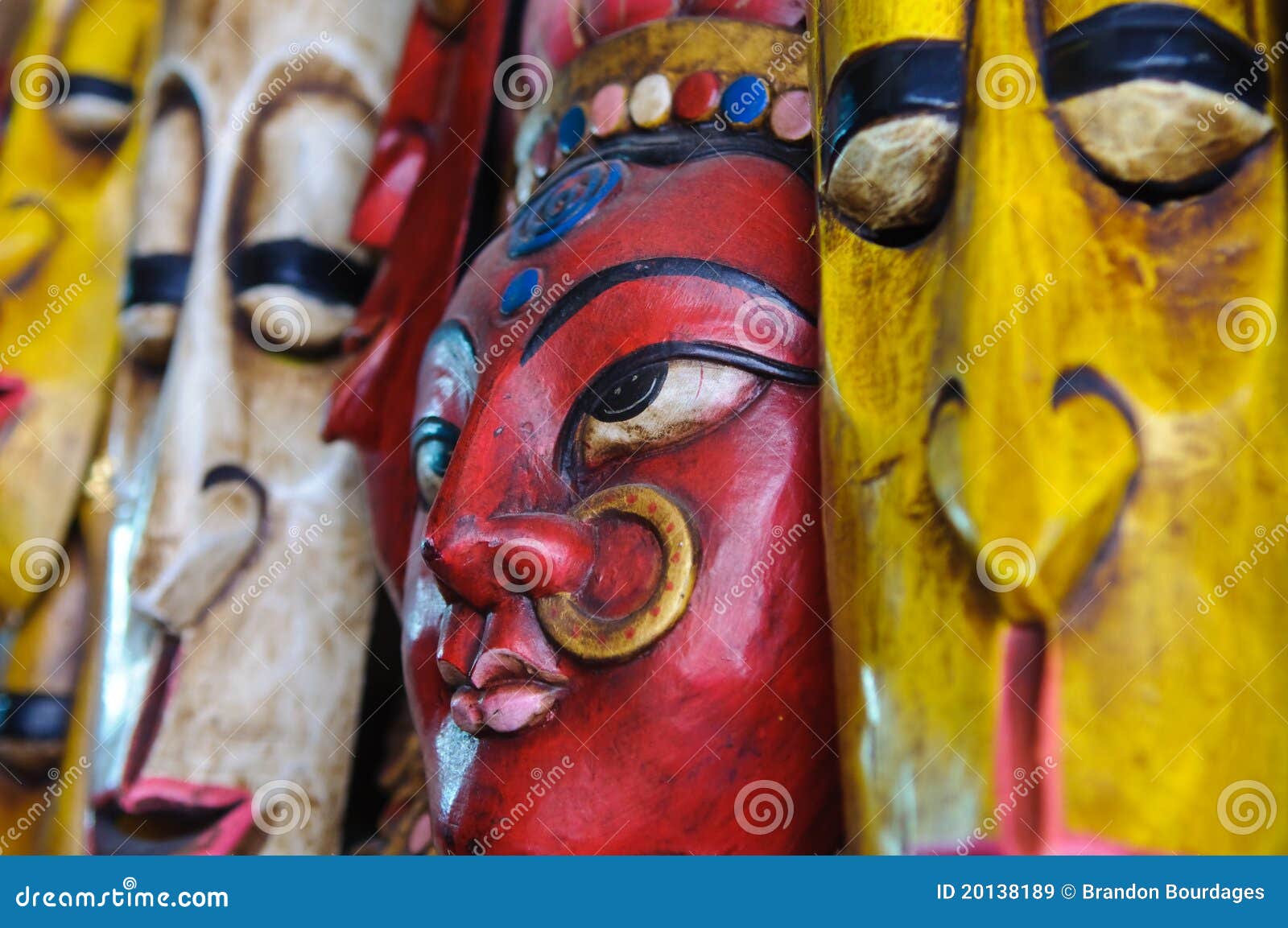 Hindu Indian Mask on Wall stock image. Image of wall - 20138189
