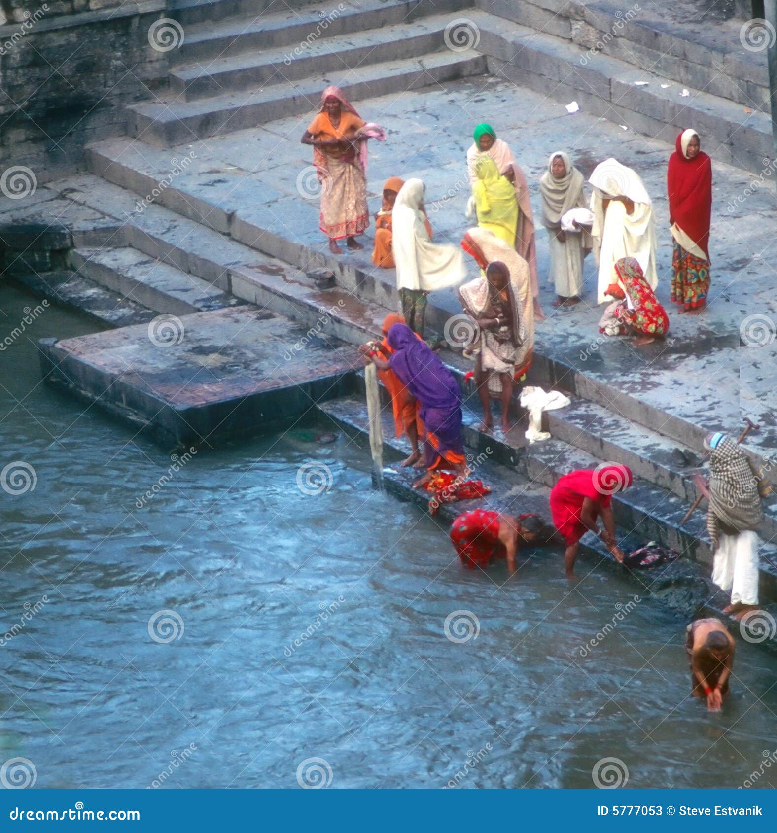 Bathing At The Hindu Ghats In The Holy River Ganges - Varanasi - India ...