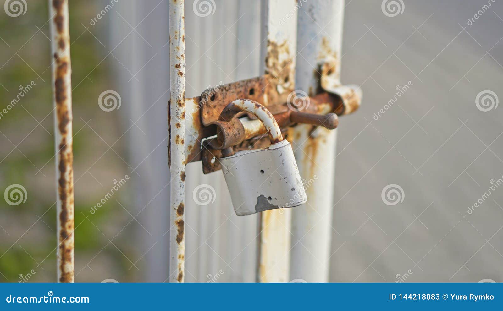 Old lock on a rusty gate stock image. Image of metal - 144218083