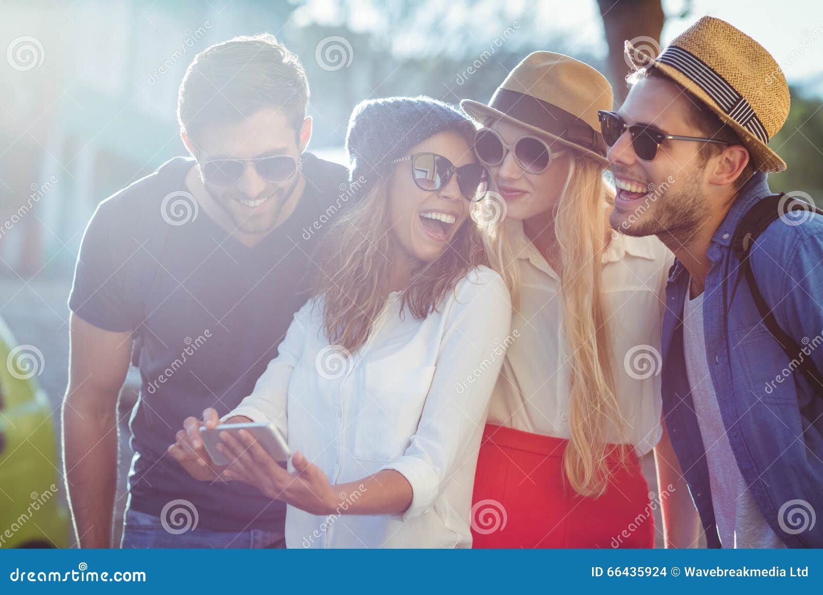 Hip Friends Checking at Smartphone Stock Photo - Image of glasses ...