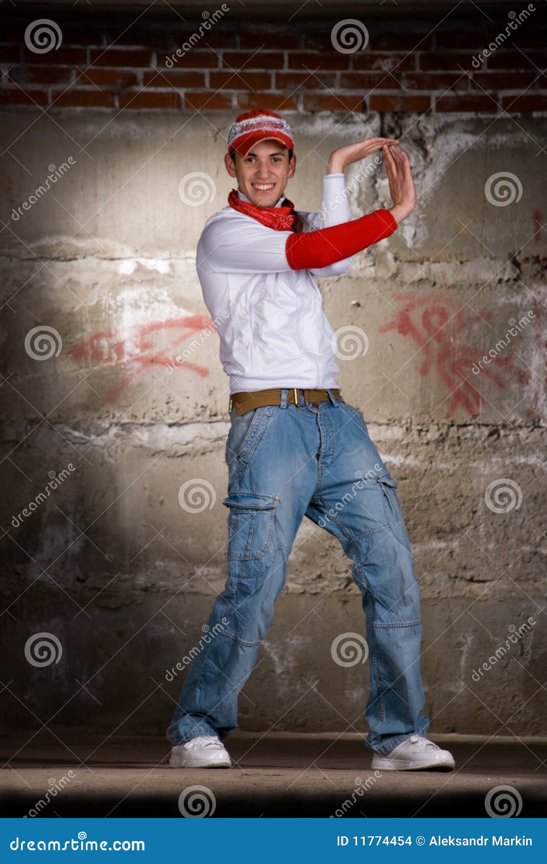 Hip Hop Boy Dancing in Modern Style Over Grey Wall Stock Photo - Image ...
